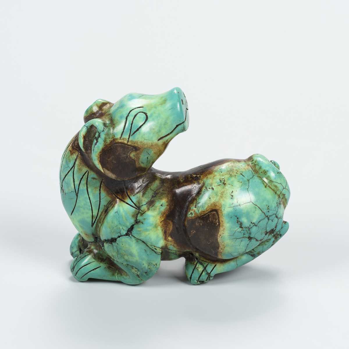 Lot 780 - A TORQUOISE SCULPTURE OF A CROUCHING TIGER,
