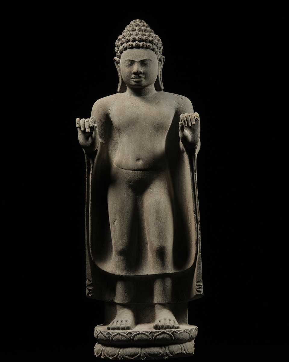 A SANDSTONE FIGURE OF BUDDHA, MON-DVARAVATI PERIOD,