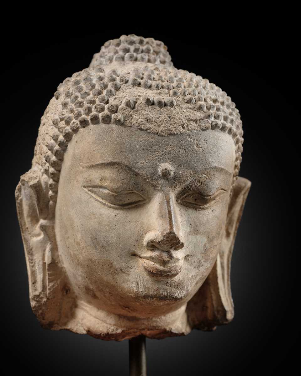 Lot 438 - A RARE SANDSTONE HEAD OF BUDDHA, PAGAN
