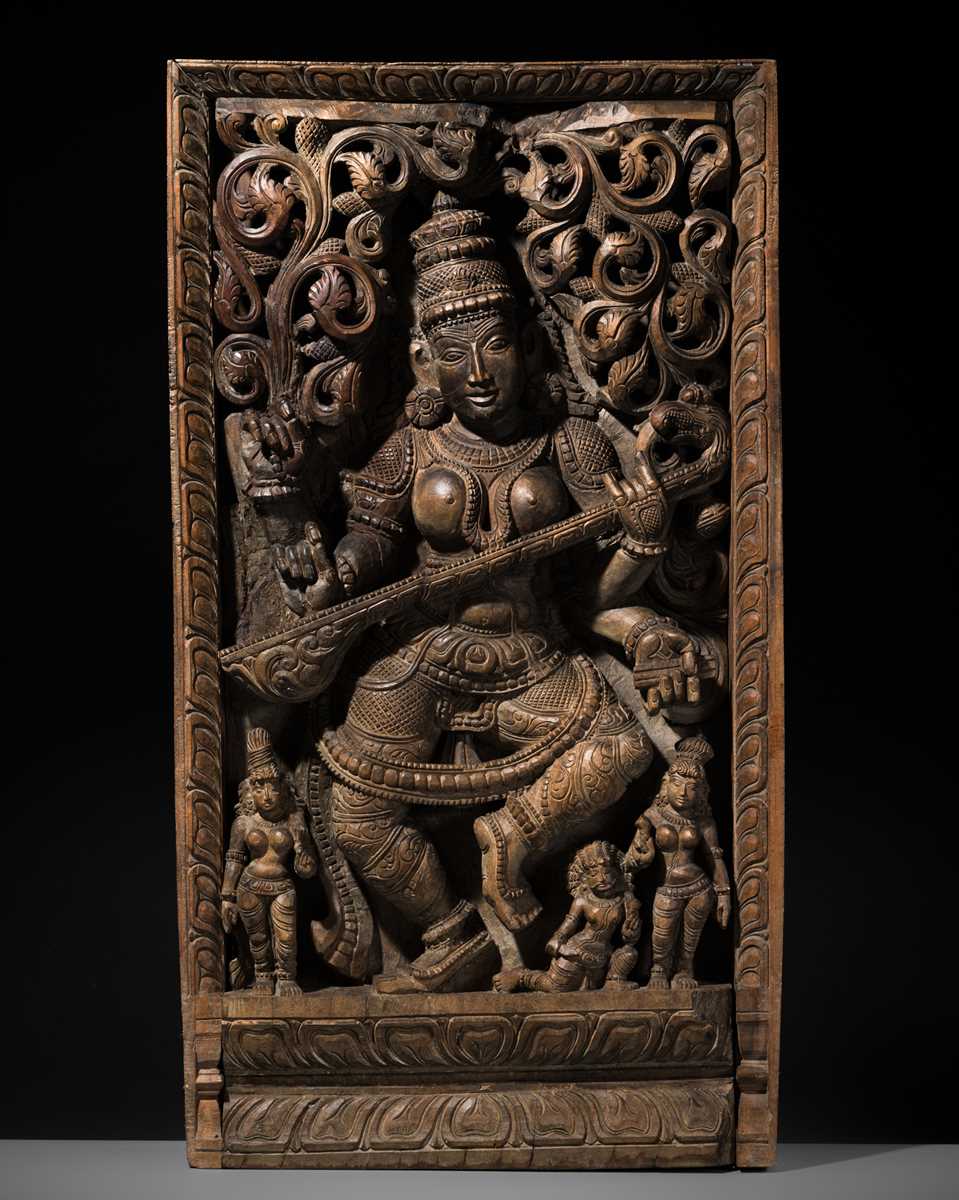 Lot 353 - A LARGE WOOD RELIEF OF SARASVATI, SOUTH