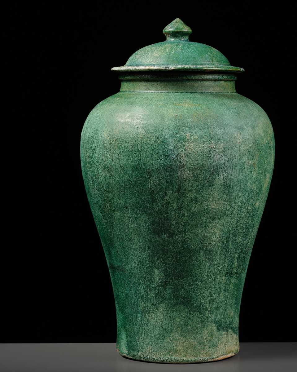 Lot 135 - A RARE GREEN-GLAZED POTTERY BALUSTER JAR AND