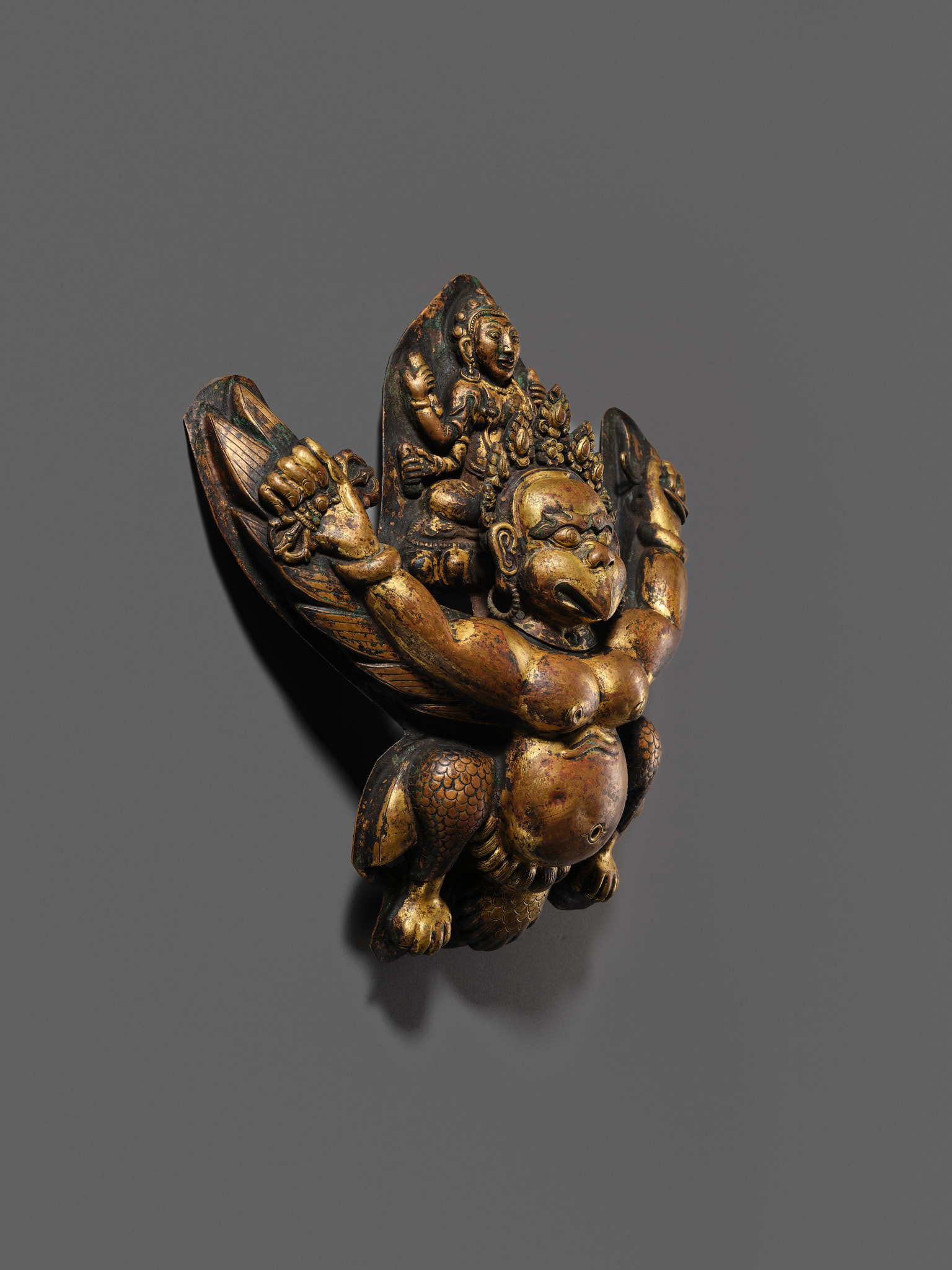Lot 276 - A GILT COPPER-ALLOY REPOUSSÉ PLAQUE OF