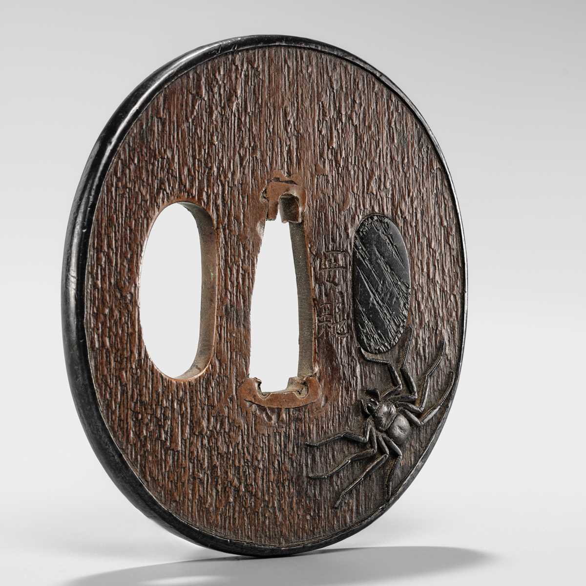 Lot 74 - YASUCHIKA: A FINE SUAKA TSUBA WITH A SPIDER