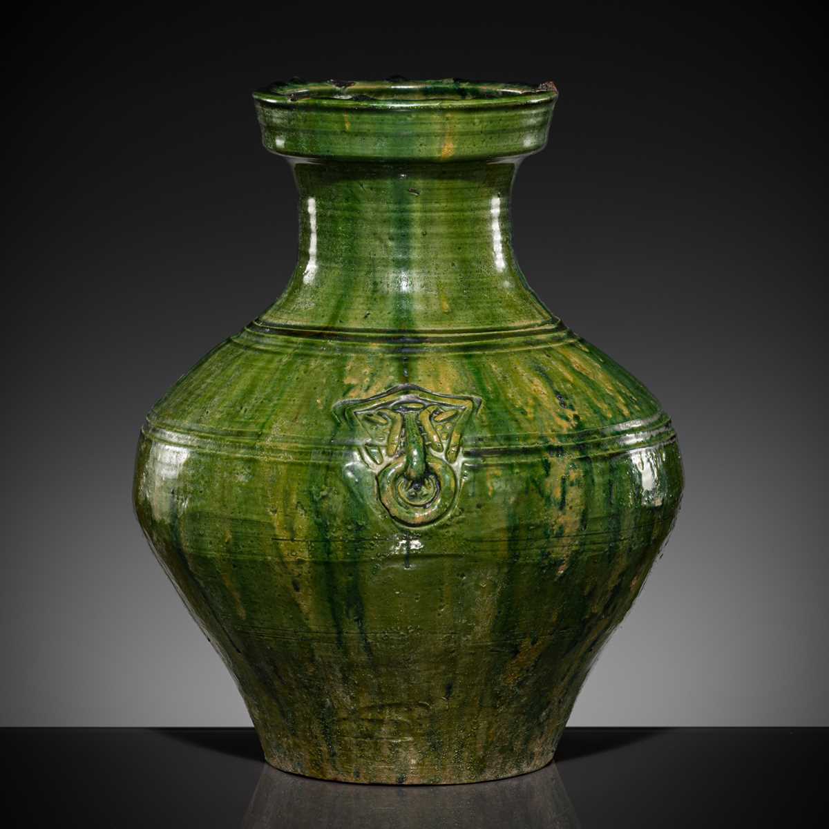 Lot 477 - A GREEN-GLAZED POTTERY VASE, HU, HAN DYNASTY