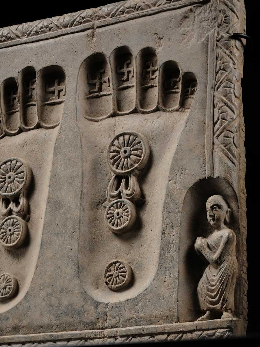 Lot 187 - A SCHIST RELIEF OF THE FOOTPRINTS OF BUDDHA,