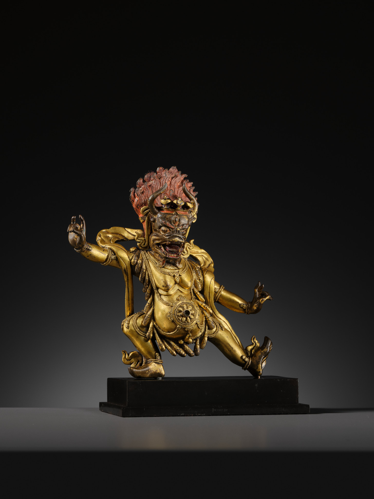 Lot 348 - A GILT BRONZE FIGURE OF YAMA DHARMARAJA,