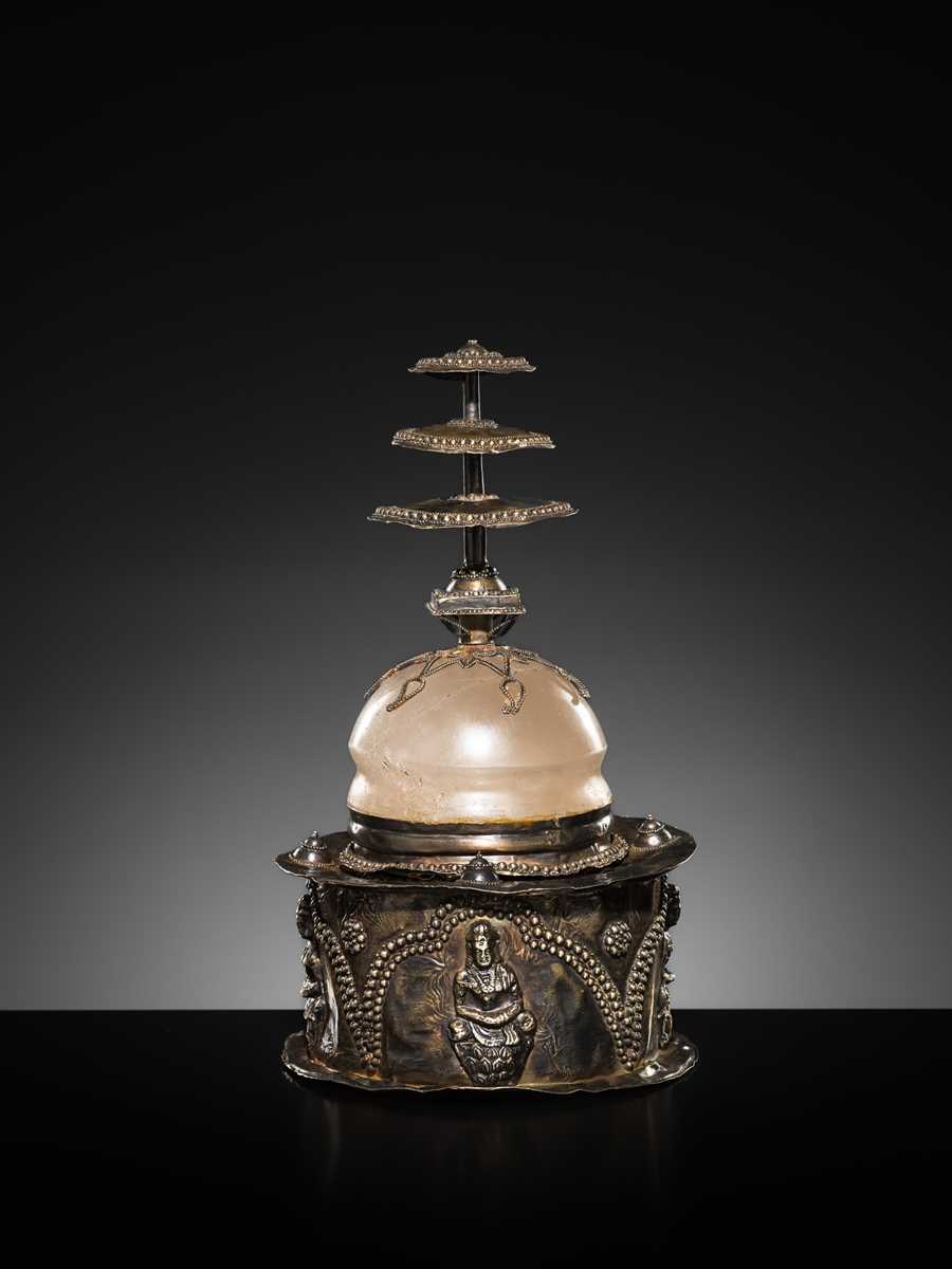 Lot 179 - A ROCK CRYSTAL AND SILVER REPOUSSÉ