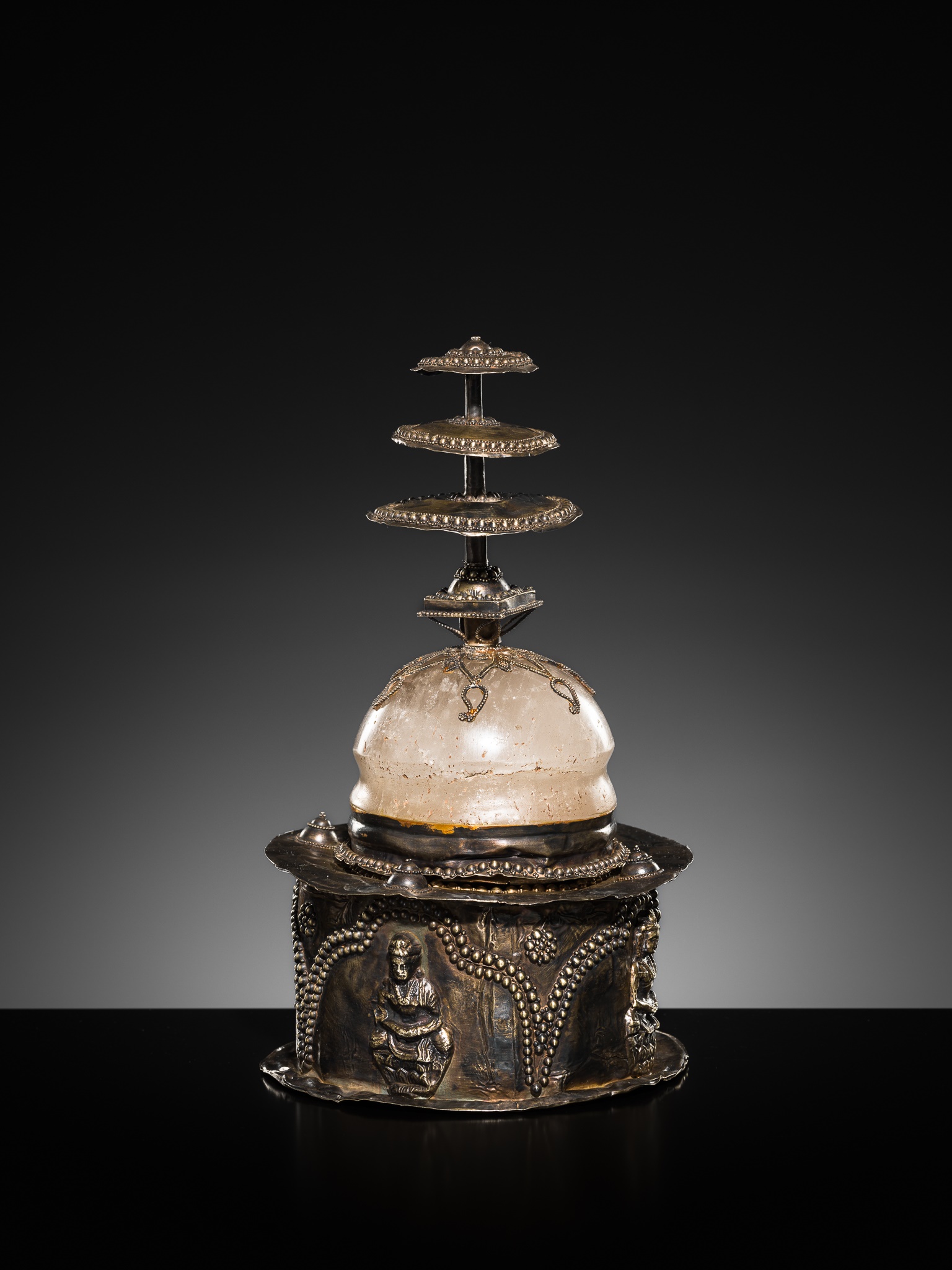 Lot 179 - A ROCK CRYSTAL AND SILVER REPOUSSÉ