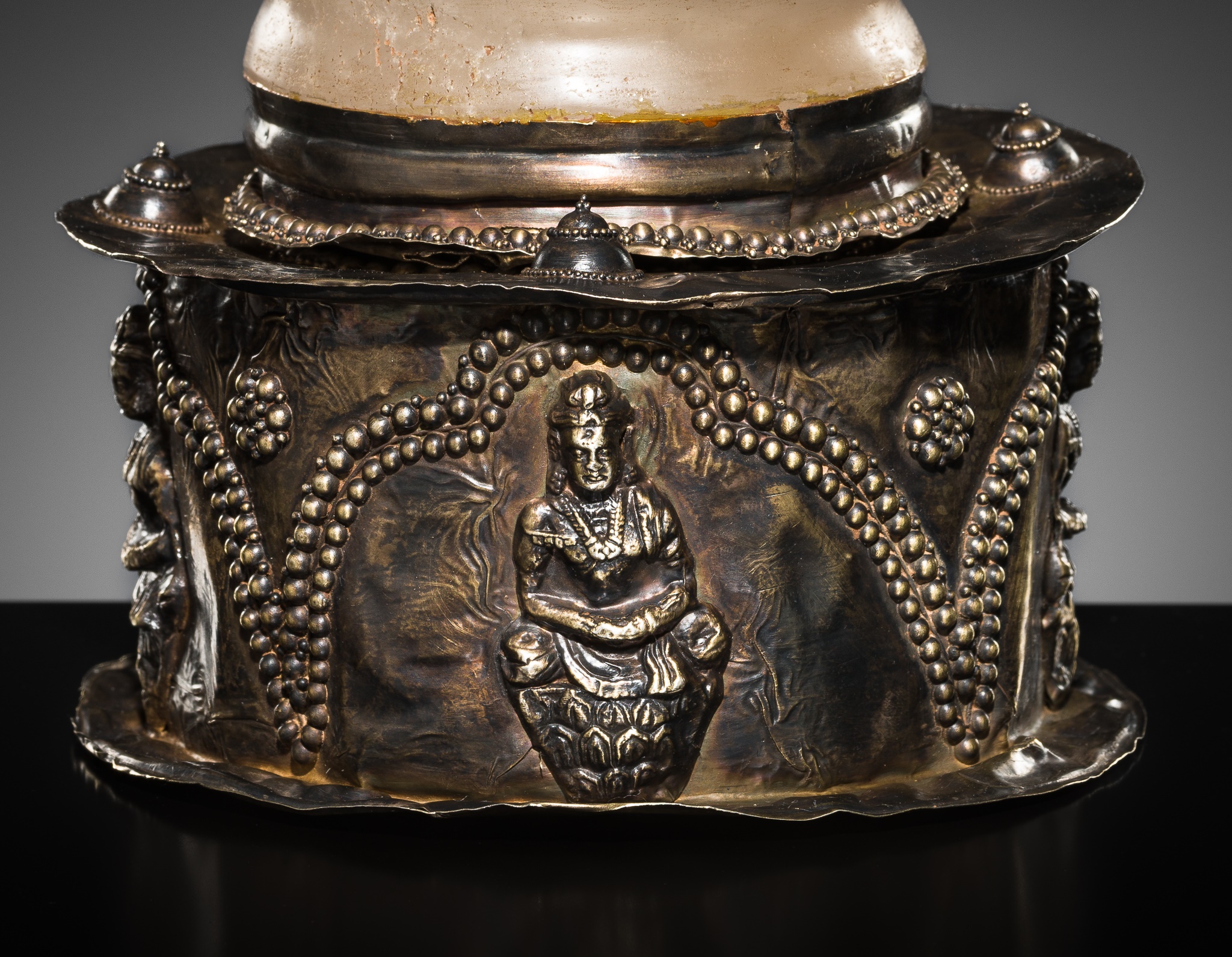 Lot 179 - A ROCK CRYSTAL AND SILVER REPOUSSÉ