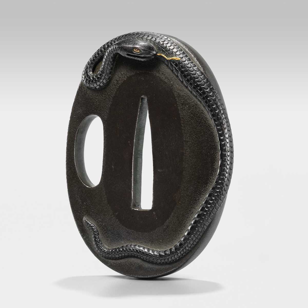 Lot 73 - AN IWAMOTO SCHOOL SHAKUDO TSUBA WITH SNAKE,