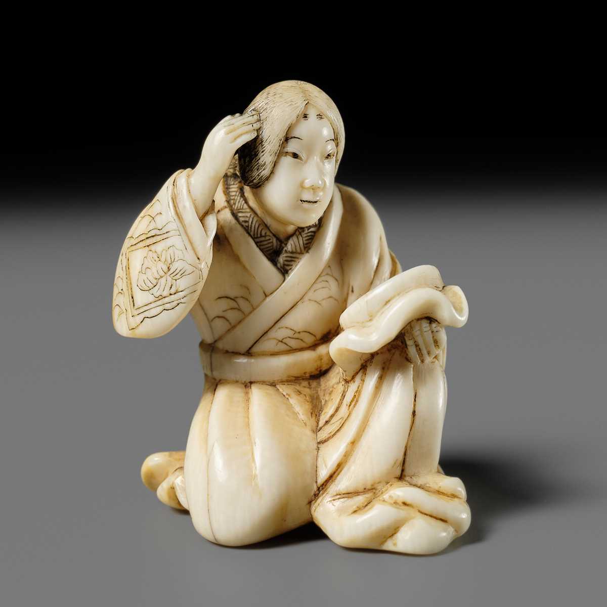 Lot 266 - TEIGETSU: A RARE IVORY NETSUKE OF A COURT