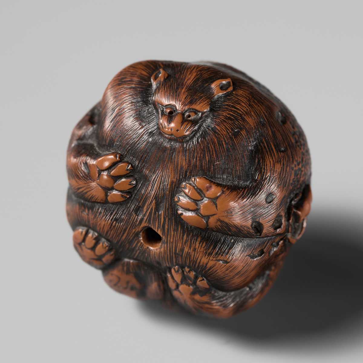 Lot 338 - MASATADA: A FINE KURUMI (WALNUT) NETSUKE OF