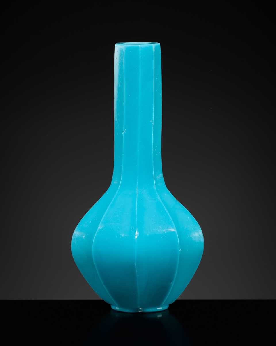 Lot 398 - A TURQUOISE GLASS FLUTED BOTTLE VASE,