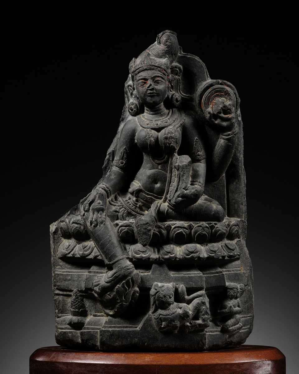Lot 591 - A BLACK STONE STELE DEPICTING PARVATI, PALA