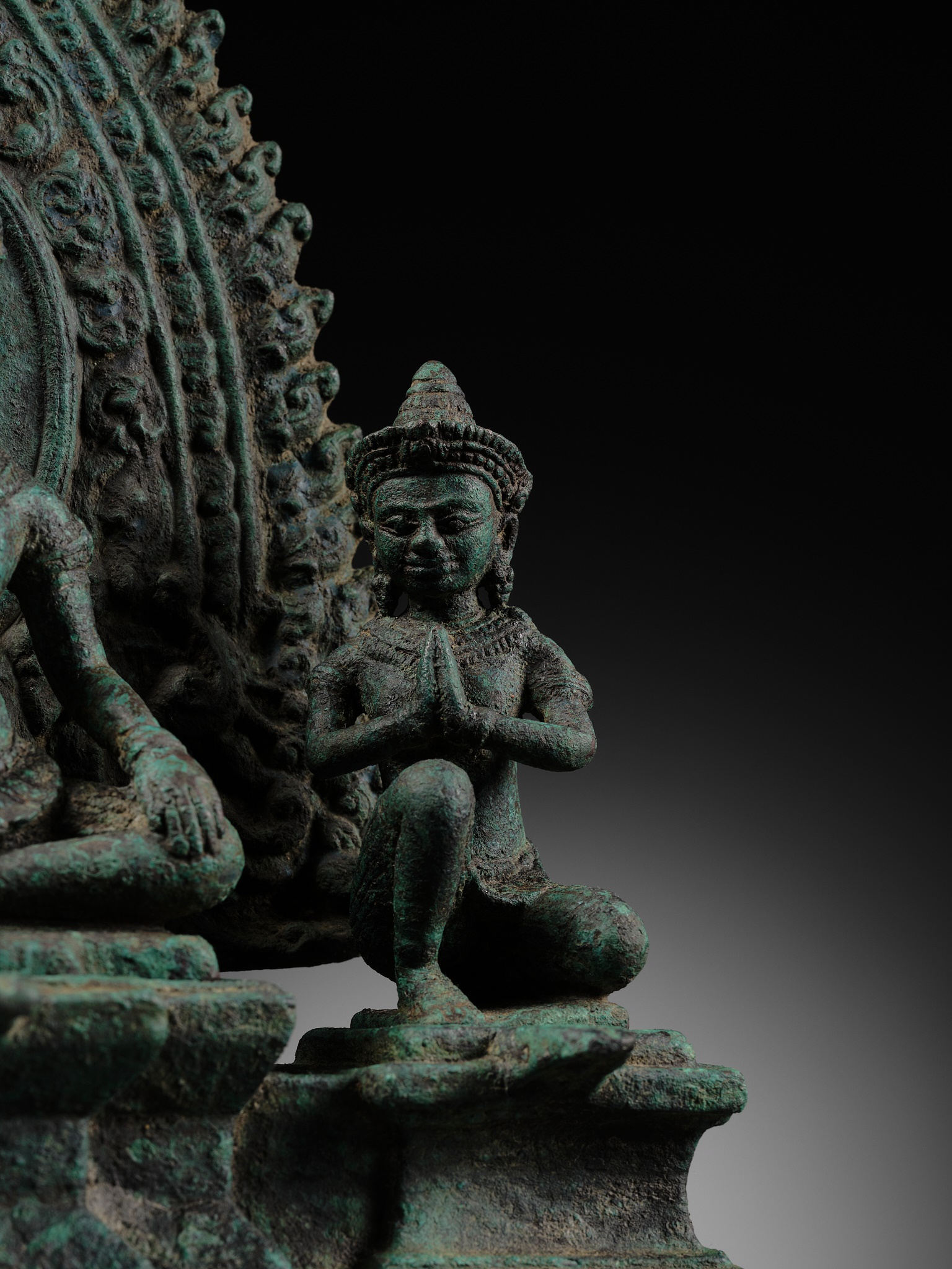 Lot 231 - A BRONZE TRIAD OF VISHVAKARMAN WITH