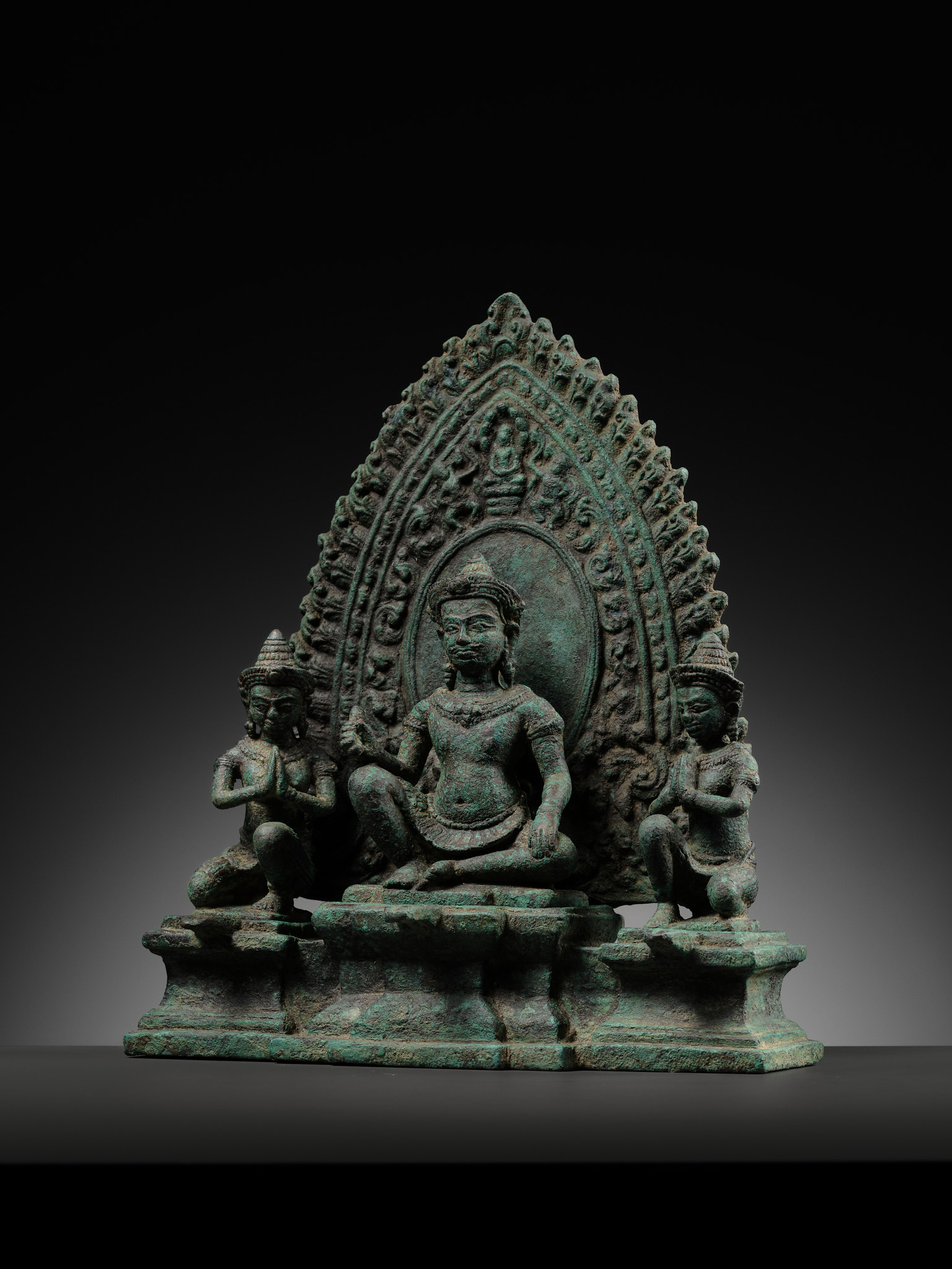 Lot 231 - A BRONZE TRIAD OF VISHVAKARMAN WITH
