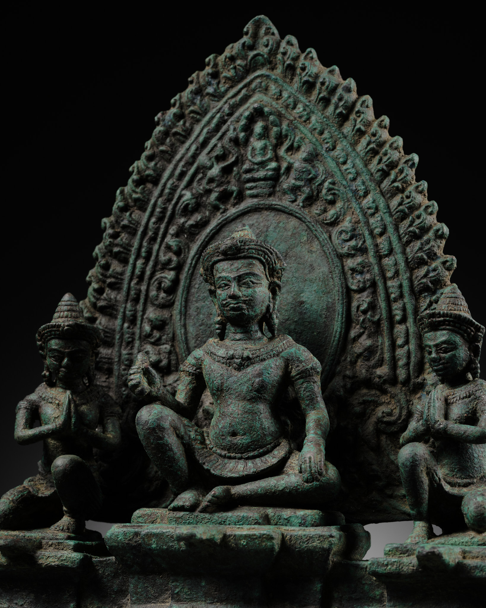 Lot 231 - A BRONZE TRIAD OF VISHVAKARMAN WITH