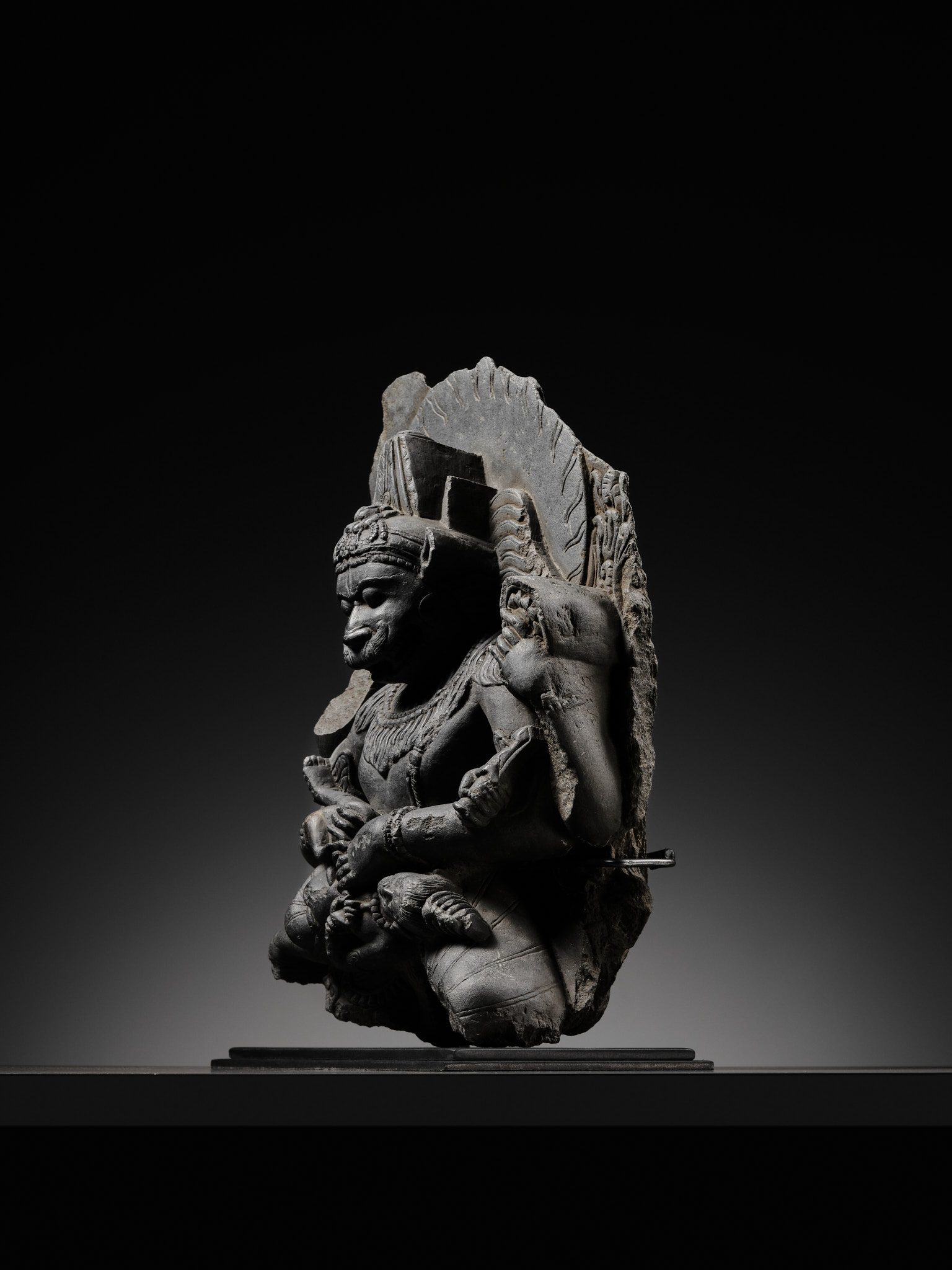 Lot 205 - A RARE BLACK STONE STELE OF NARASIMHA