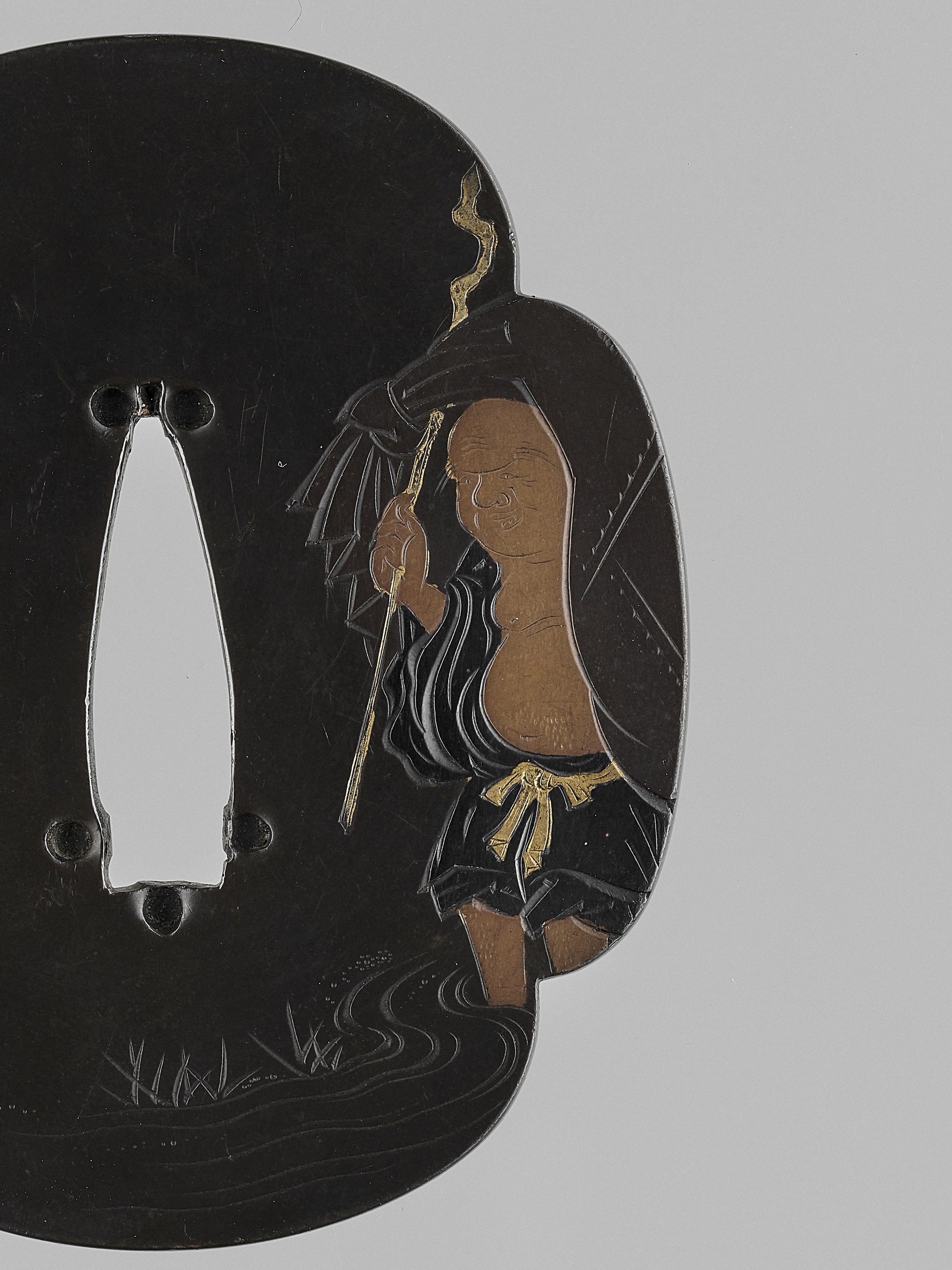 Lot 35 - MOTONOBU: A SHIBUICHI TSUBA WITH HOTEI