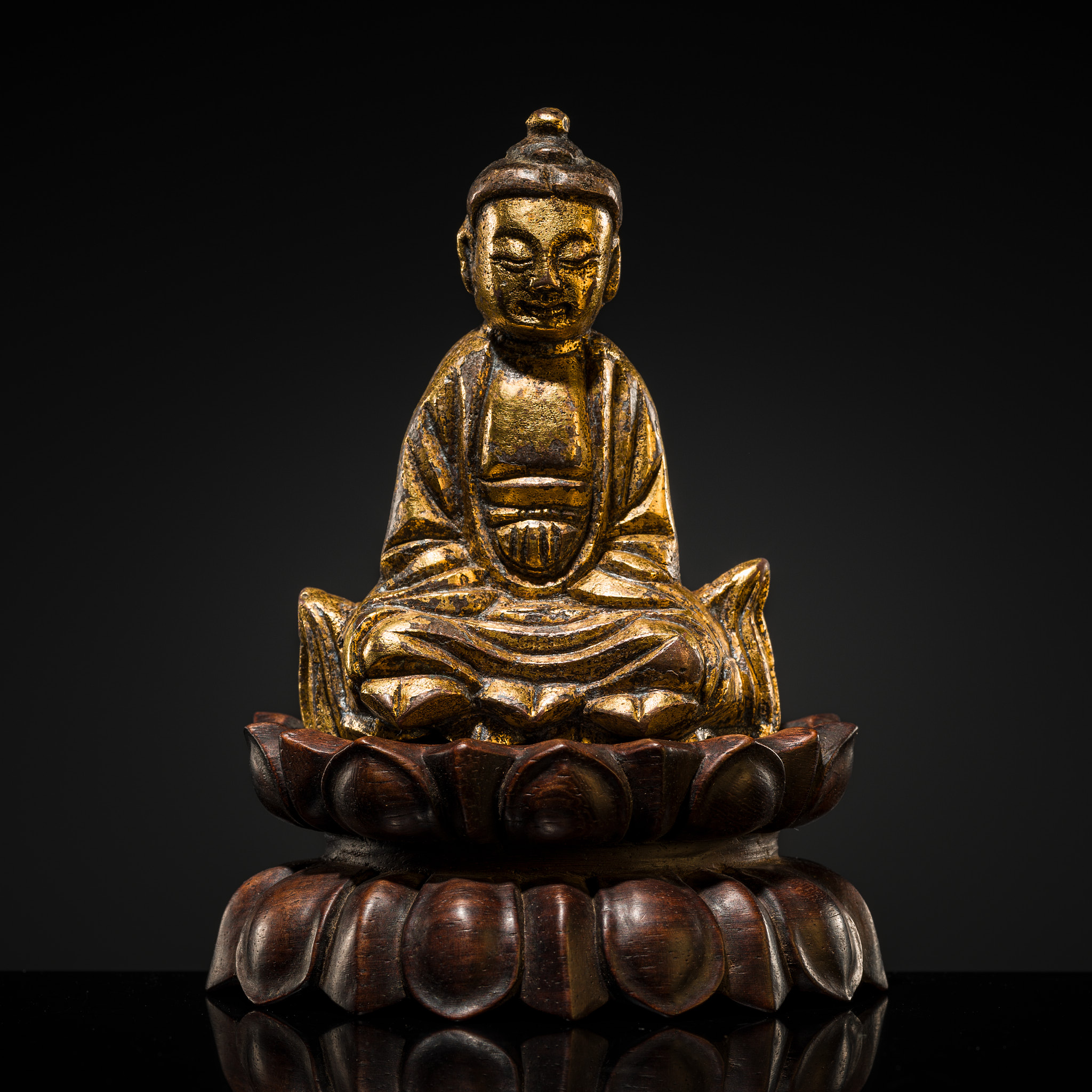 Lot 98 - A RARE AND INSCRIBED GILT-BRONZE FIGURE OF