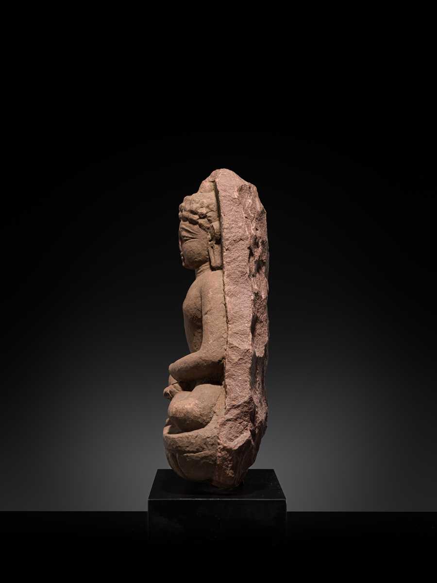 Lot 323 - A RARE RED SANDSTONE STELE OF A SEATED JINA,