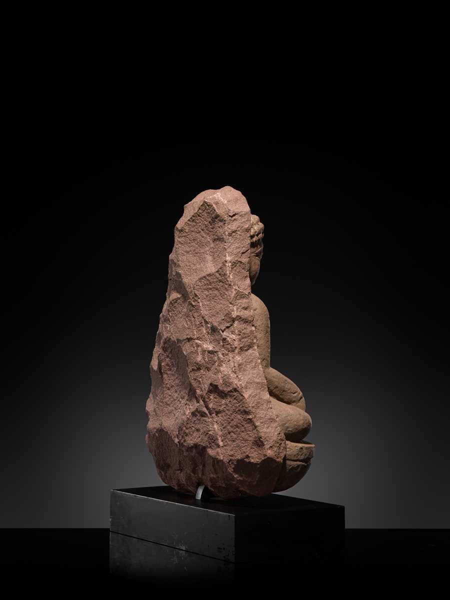 Lot 323 - A RARE RED SANDSTONE STELE OF A SEATED JINA,