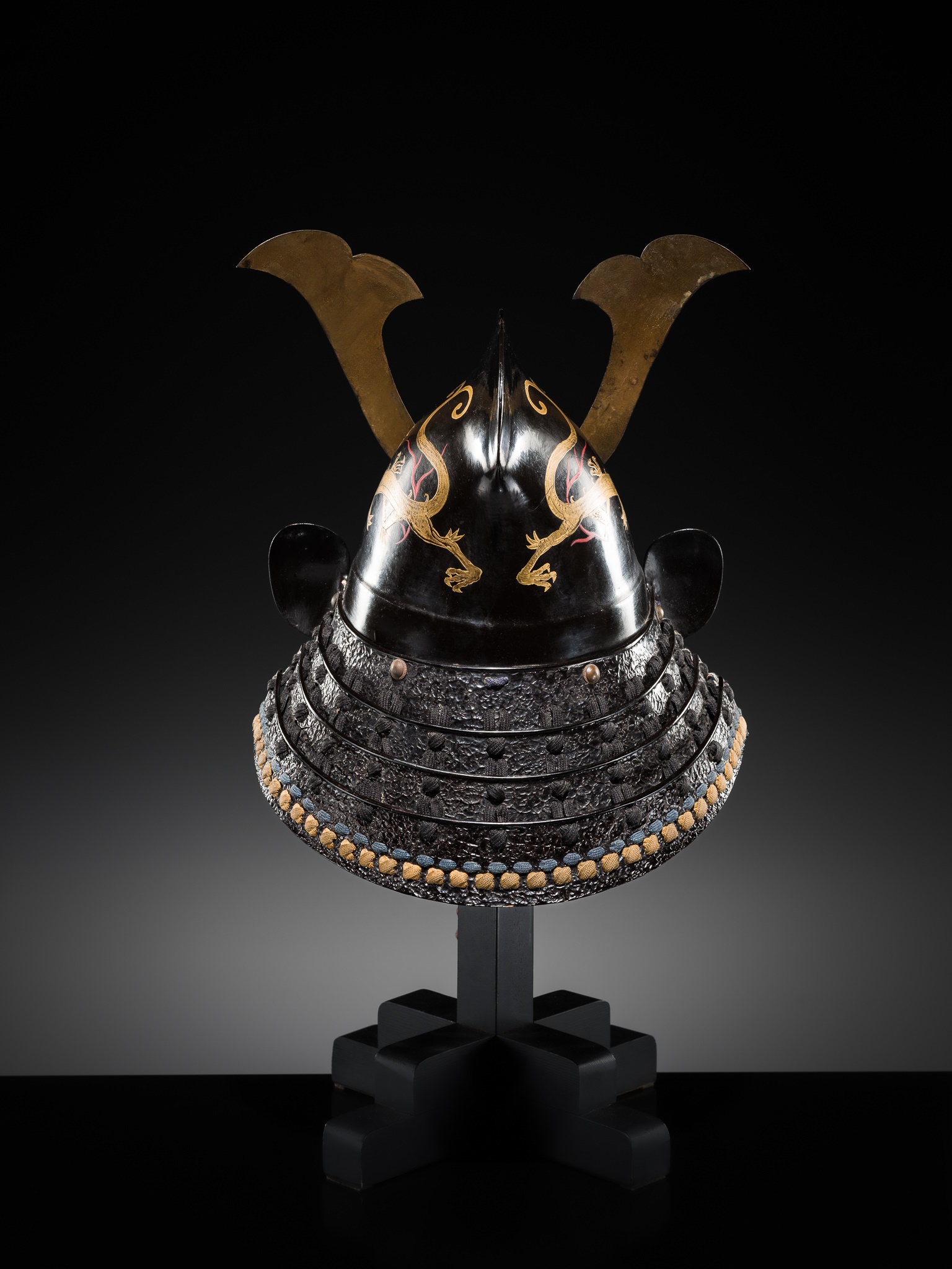 Lot 101 - A LACQUERED IRON EBOSHI NARI ‘DRAGONS’