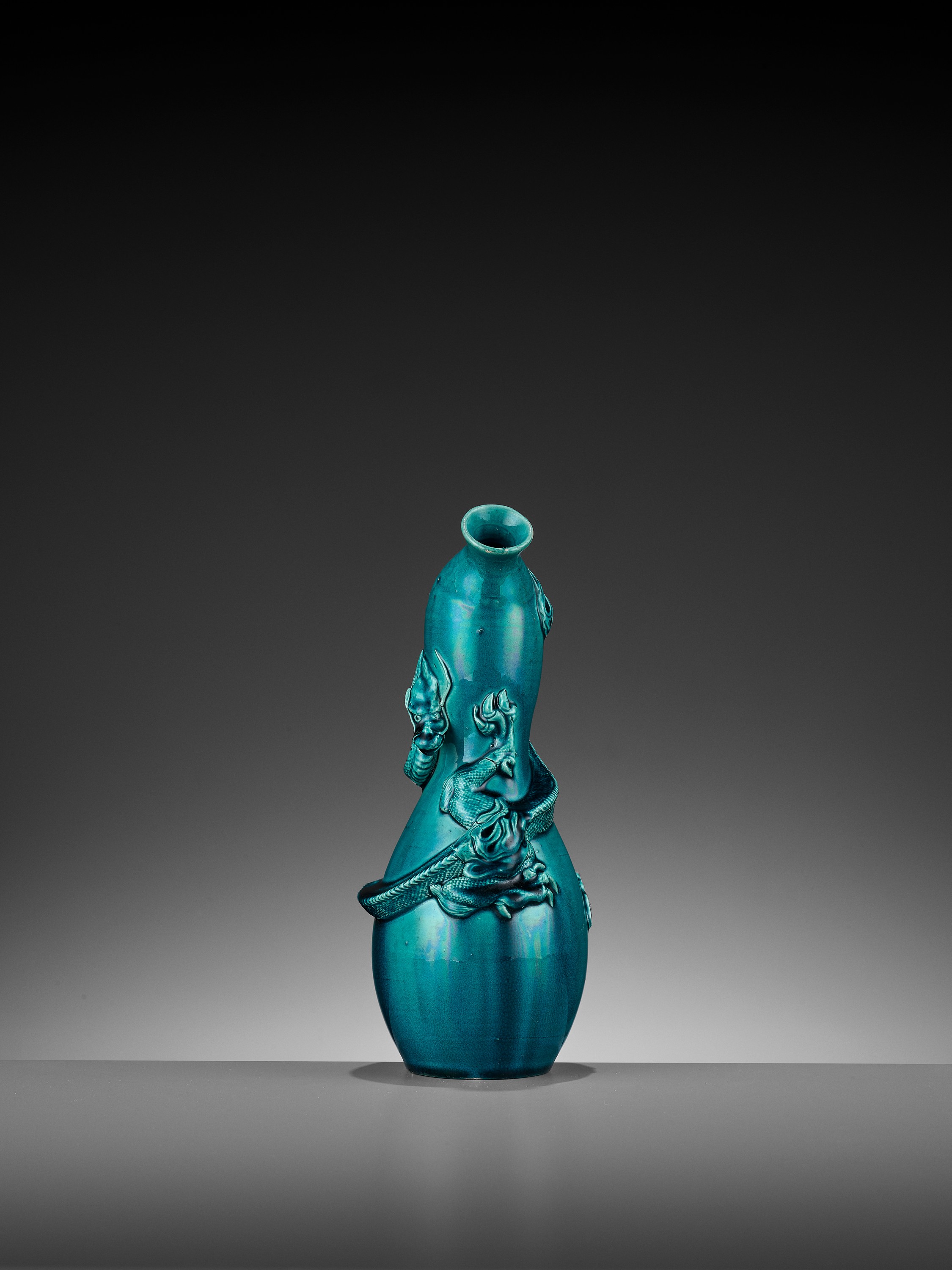 Lot 304 - A TURQUOISE-GLAZED DOUBLE-GOURD ‘DRAGON’