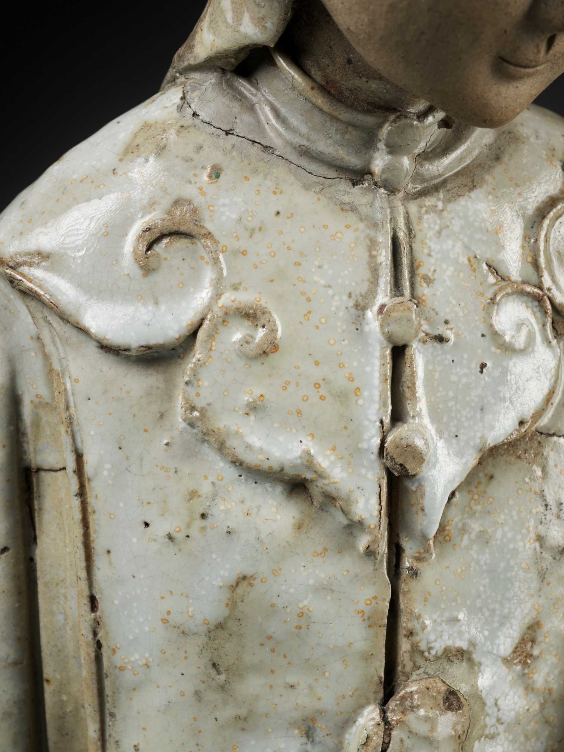 Lot 142 - A QINGBAI FIGURE OF A NOBLE LADY, YUAN