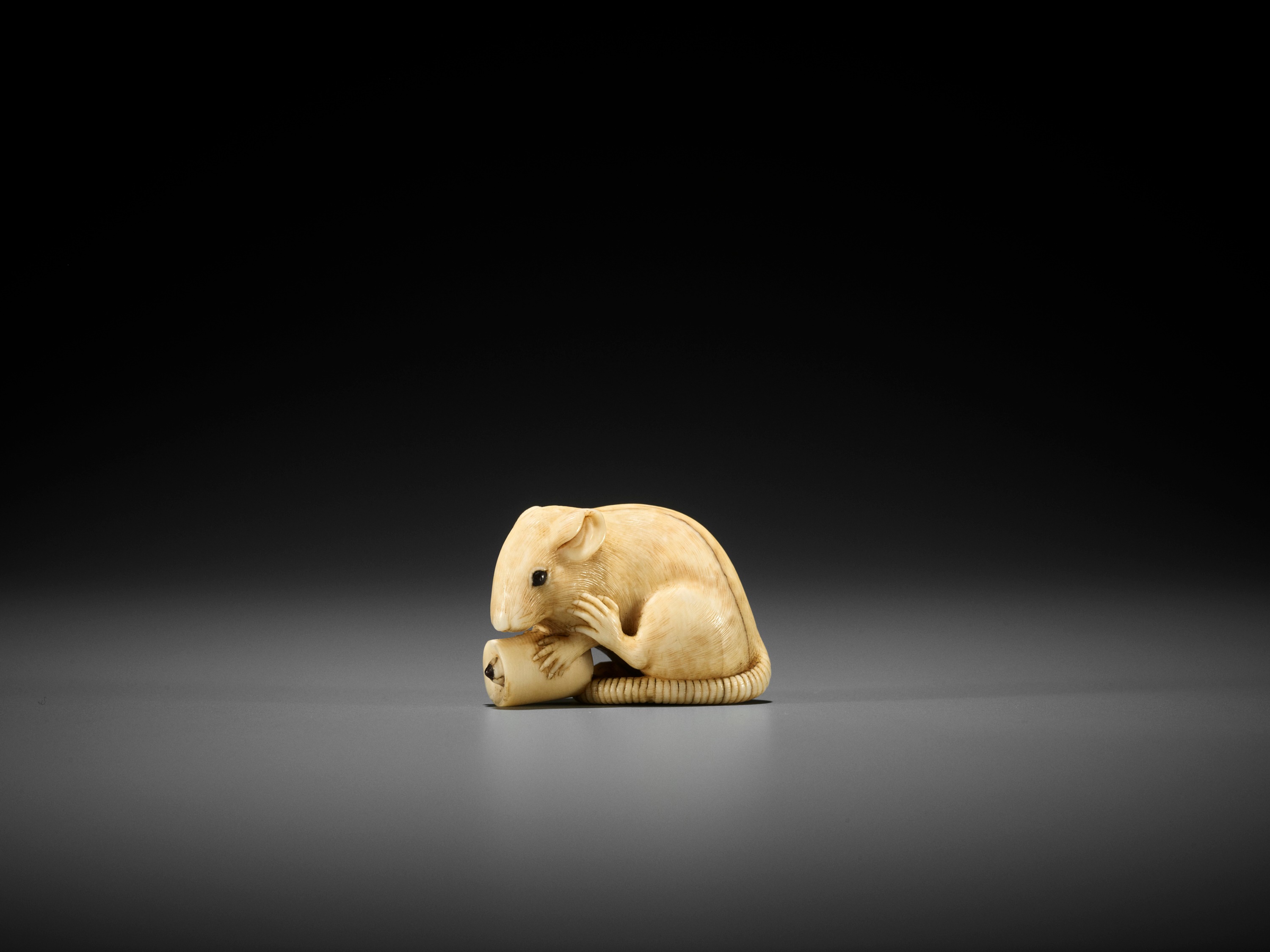 Lot 45 - OKATOMO: A FINE IVORY NETSUKE OF A RAT WITH