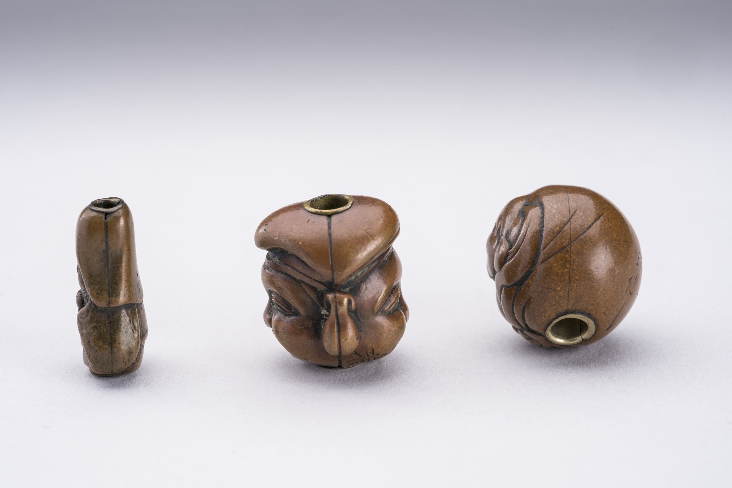Lot 1581 - A GROUP OF THREE COPPER OJIME, 19th CENTURY