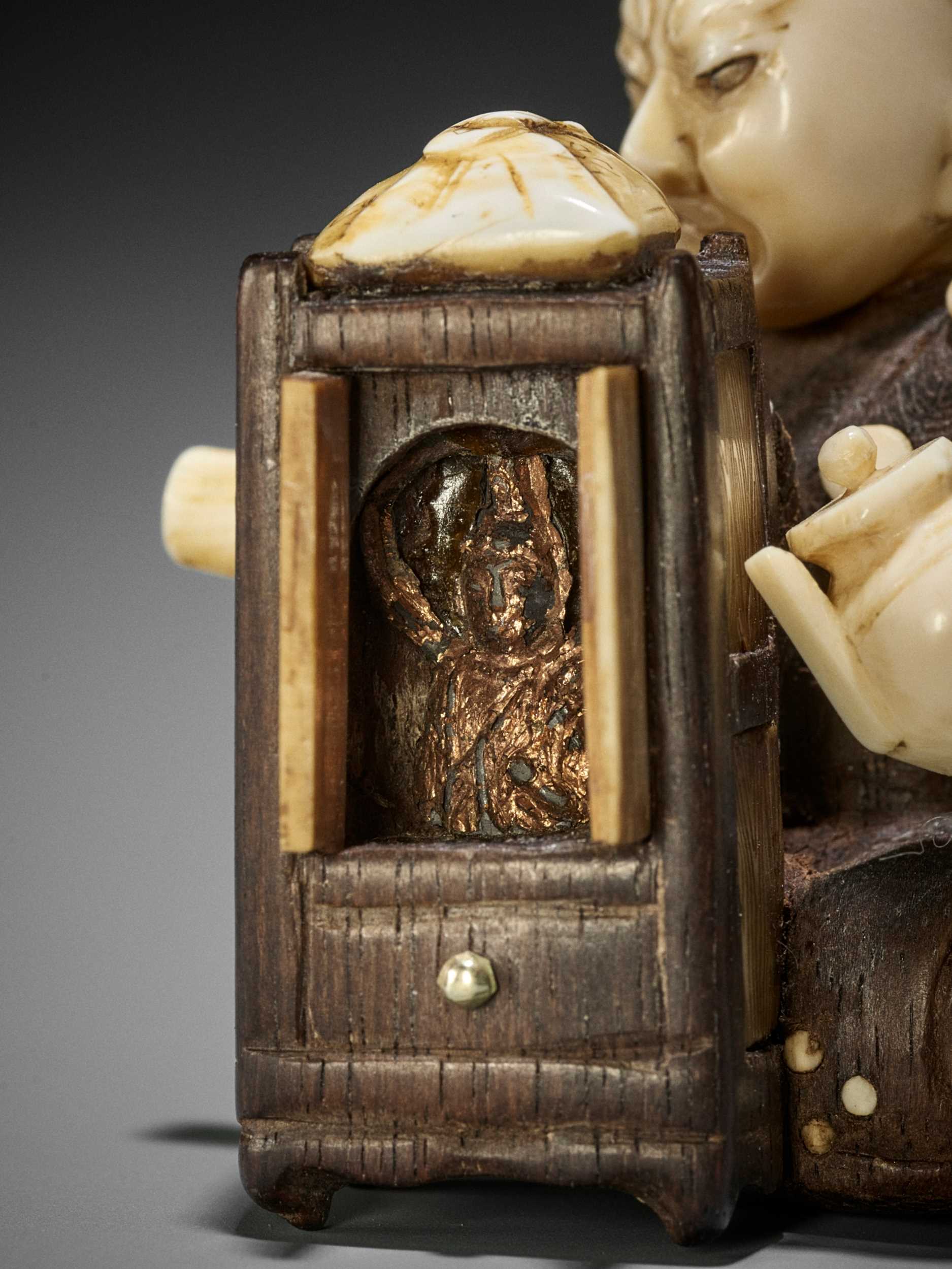 Lot 237 - HOZAN: AN INLAID WOOD NETSUKE OF A YAMABUSHI