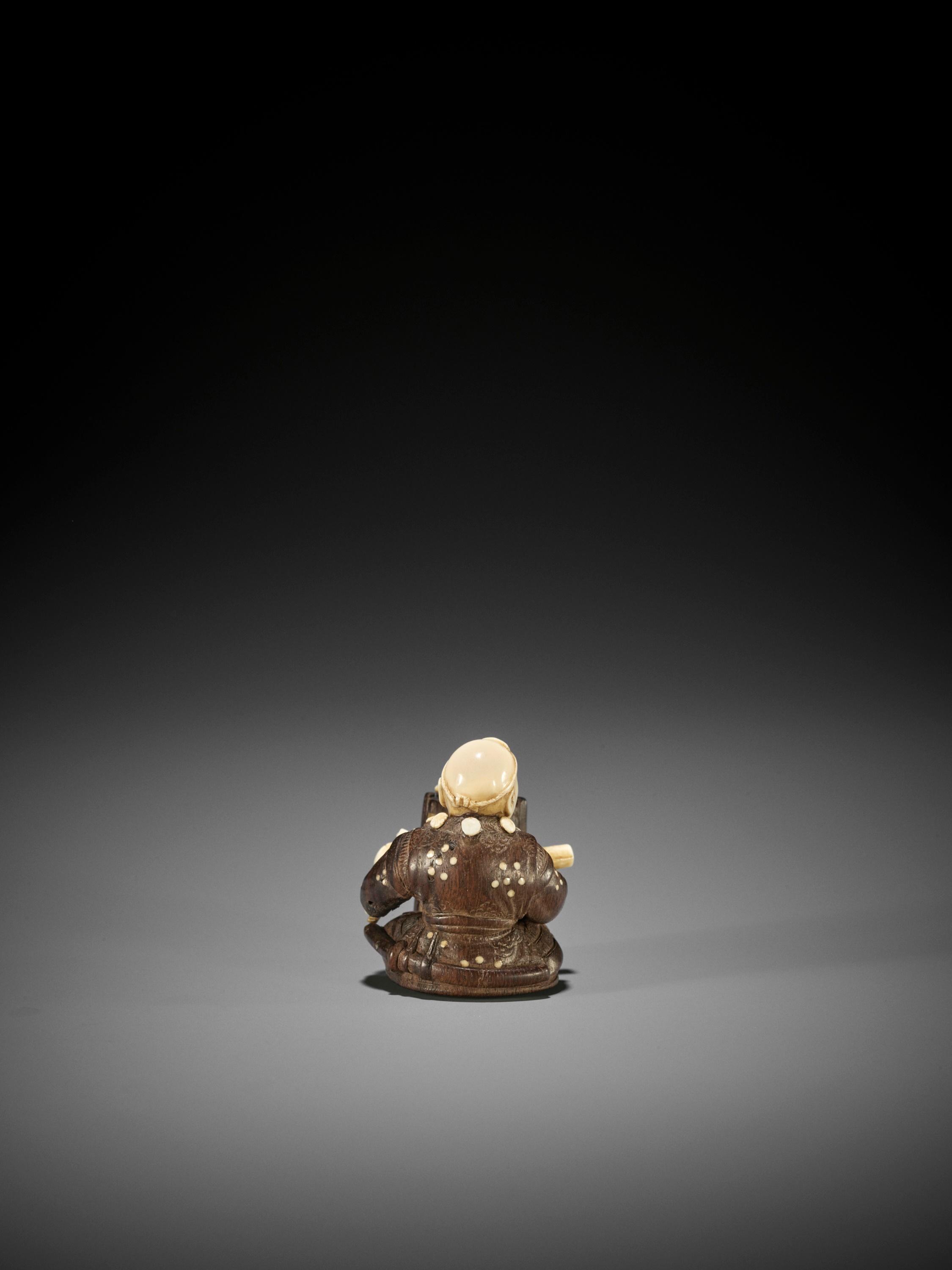 Lot 237 - HOZAN: AN INLAID WOOD NETSUKE OF A YAMABUSHI