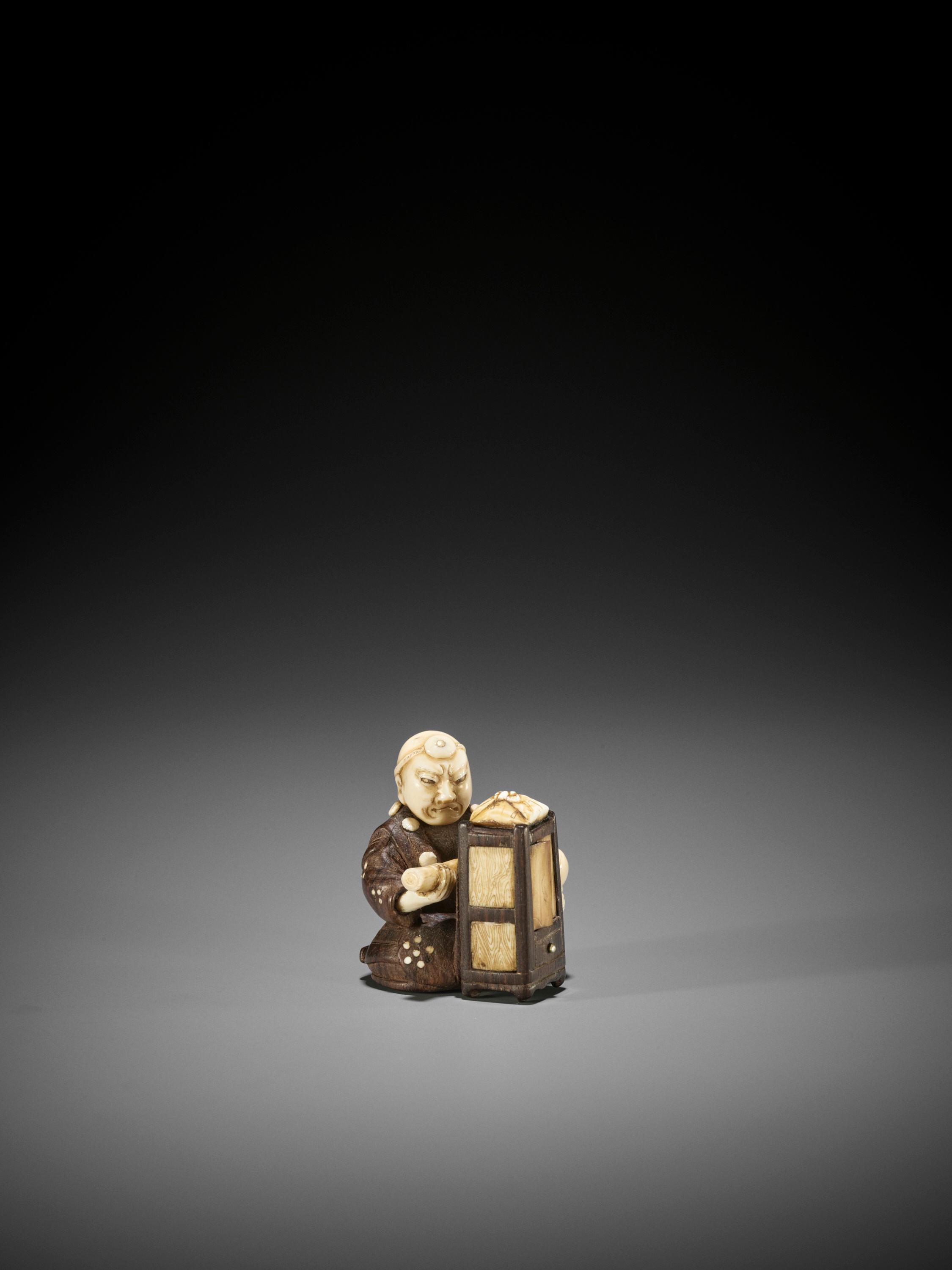 Lot 237 - HOZAN: AN INLAID WOOD NETSUKE OF A YAMABUSHI