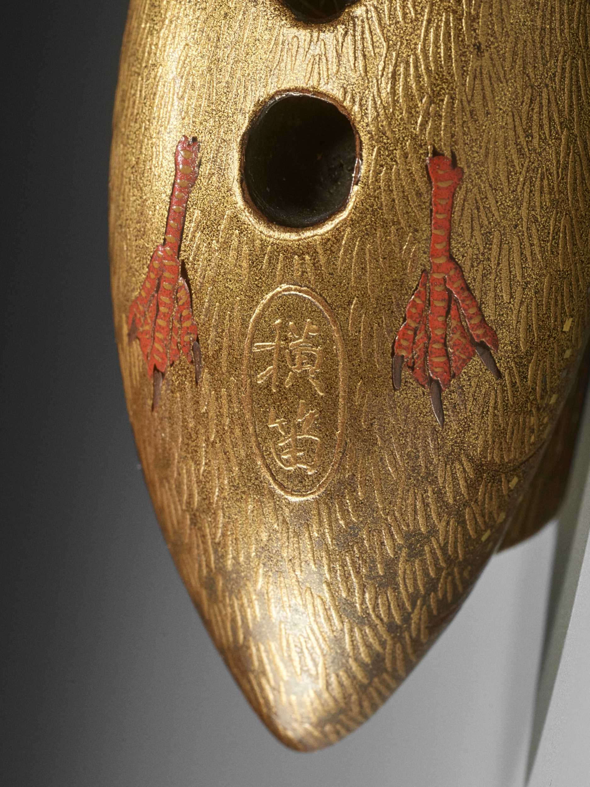 Lot 320 - YOKOBUE III: A RARE LACQUERED WOOD NETSUKE