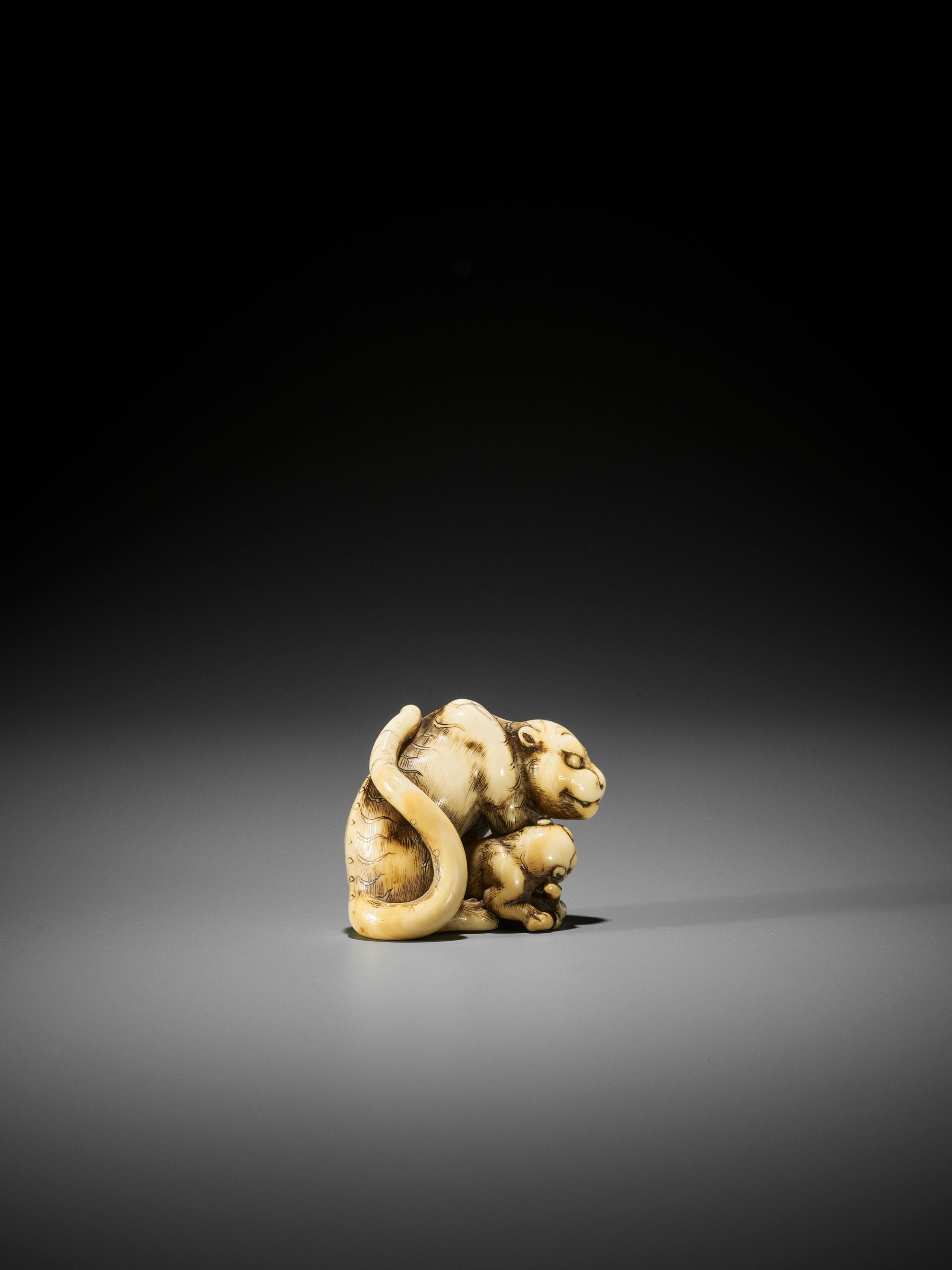 Lot 53 - TOMOTADA: AN EXCEPTIONAL IVORY NETSUKE OF A