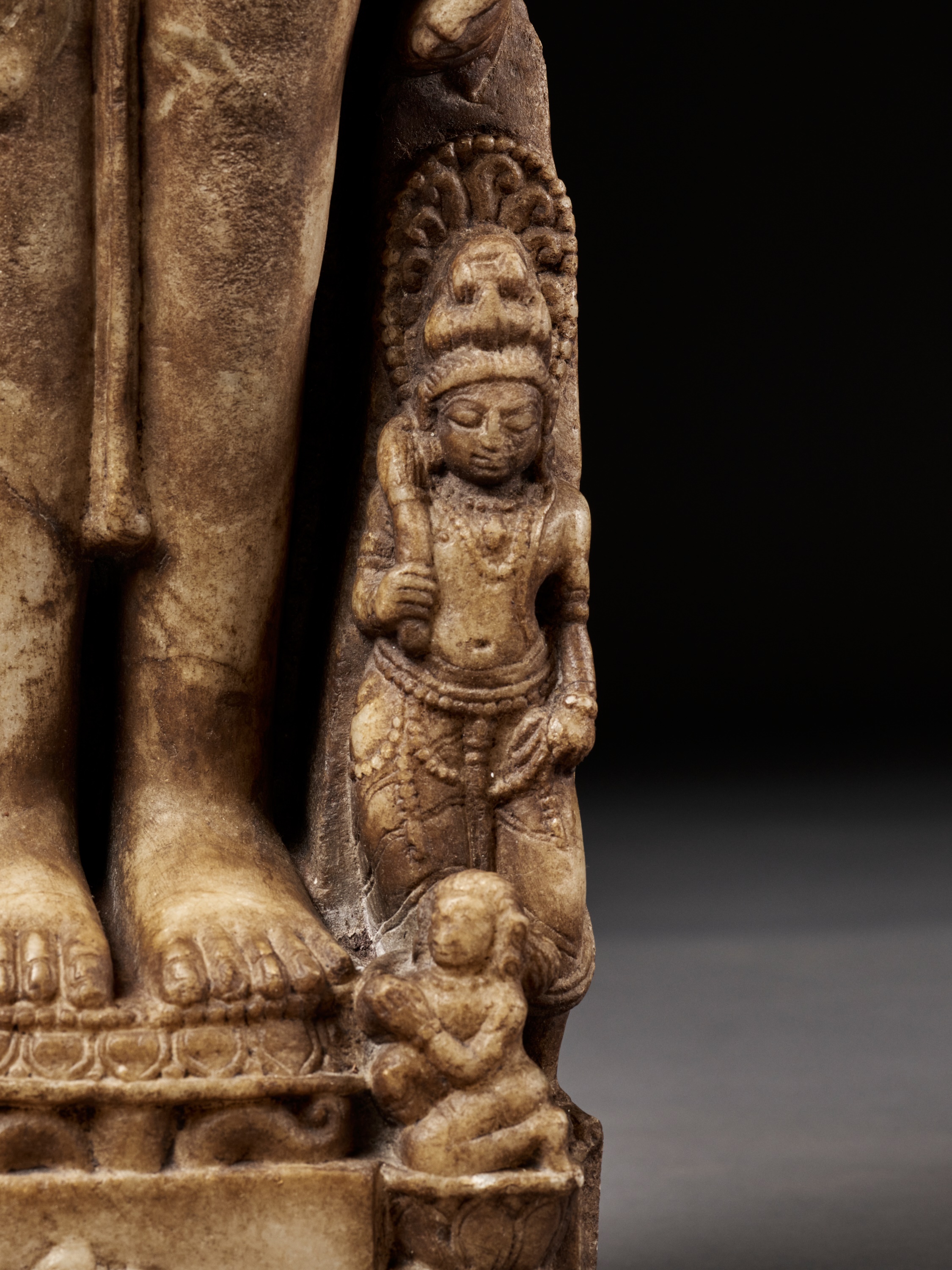 Lot 598 - A JAIN MARBLE FIGURE OF RISHABHANATHA, THE