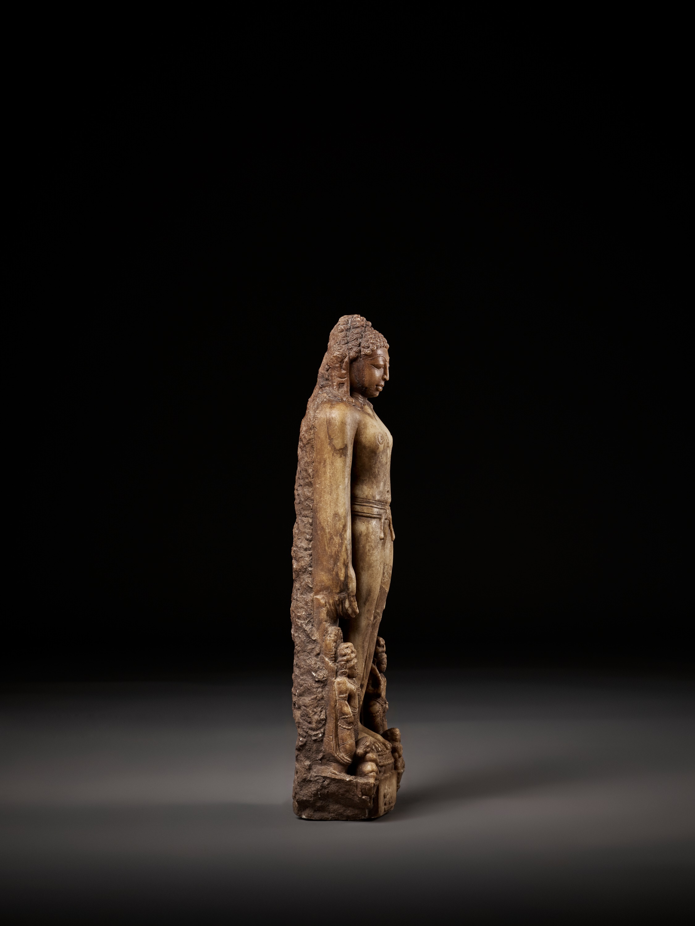 Lot 598 - A JAIN MARBLE FIGURE OF RISHABHANATHA, THE