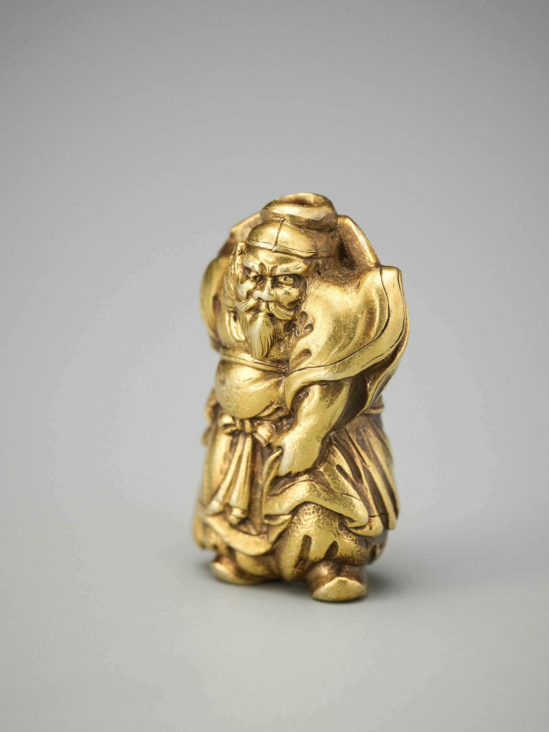 Lot 314 - RYUMIN: A VERY RARE SOLID GOLD OJIME OF