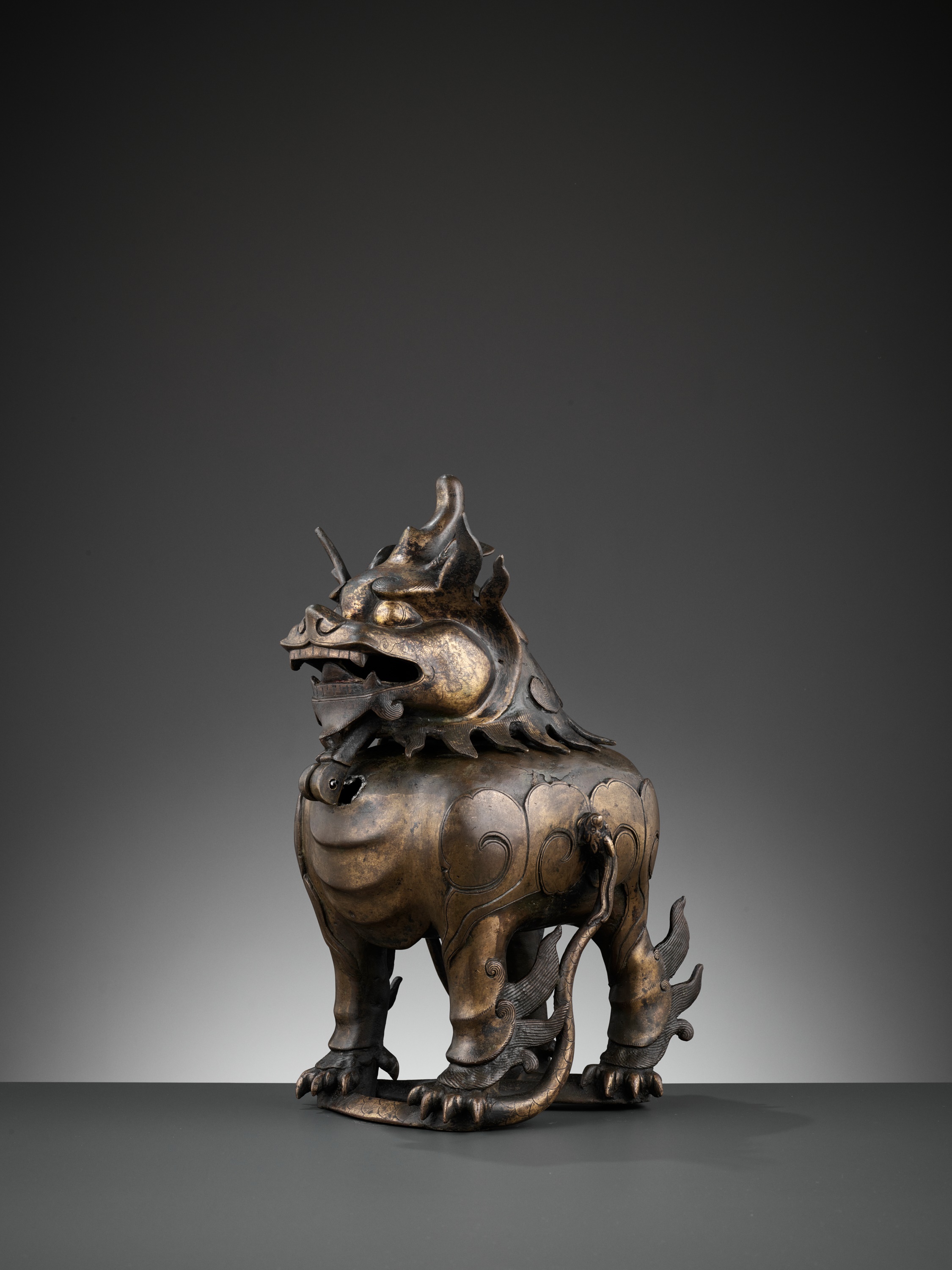 Lot 359 - A MONUMENTAL ‘LUDUAN’ PARCEL-GILT BRONZE