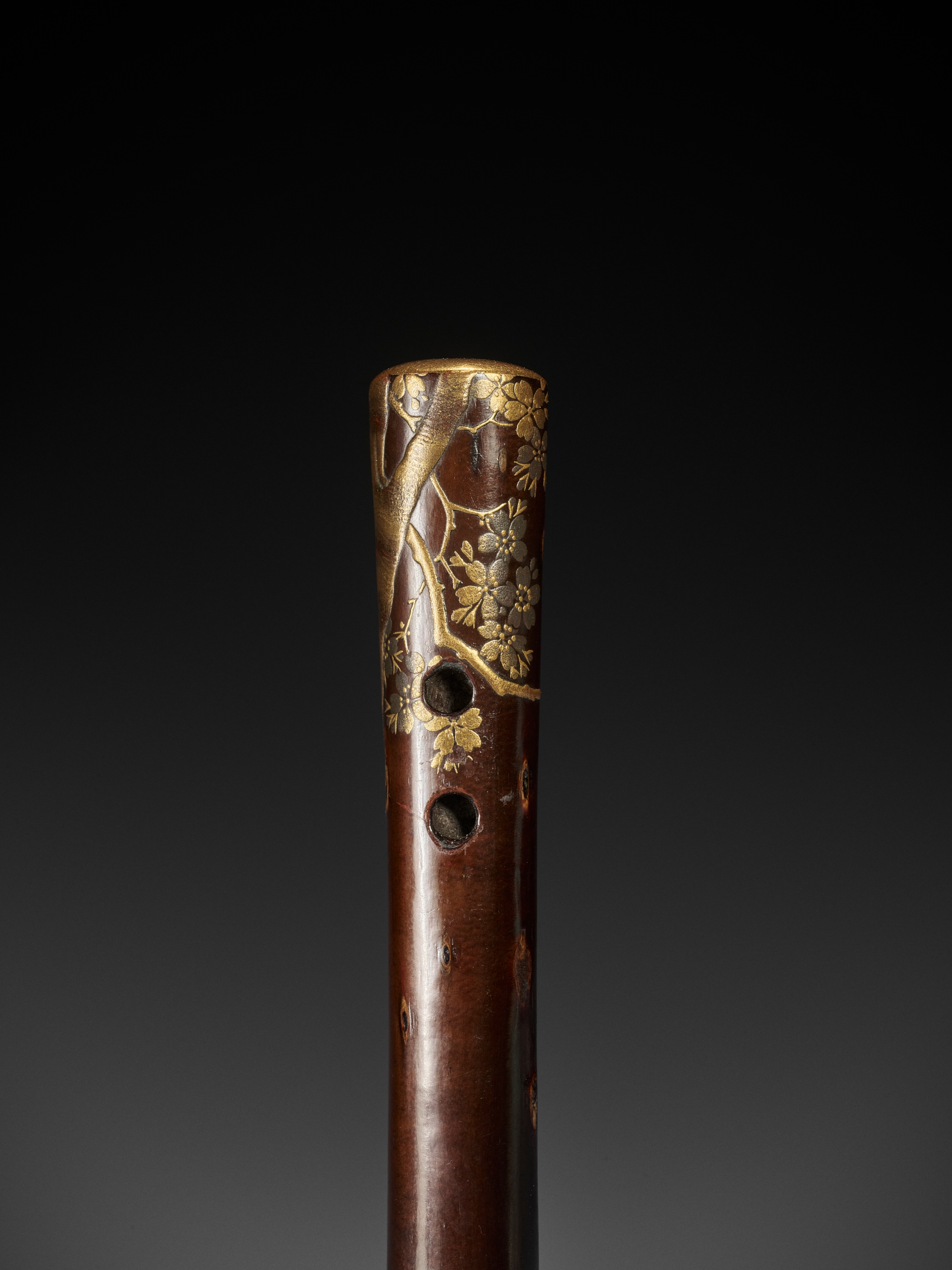 Lot 216 - A LACQUERED WOOD SASHI NETSUKE OF TAIRA NO