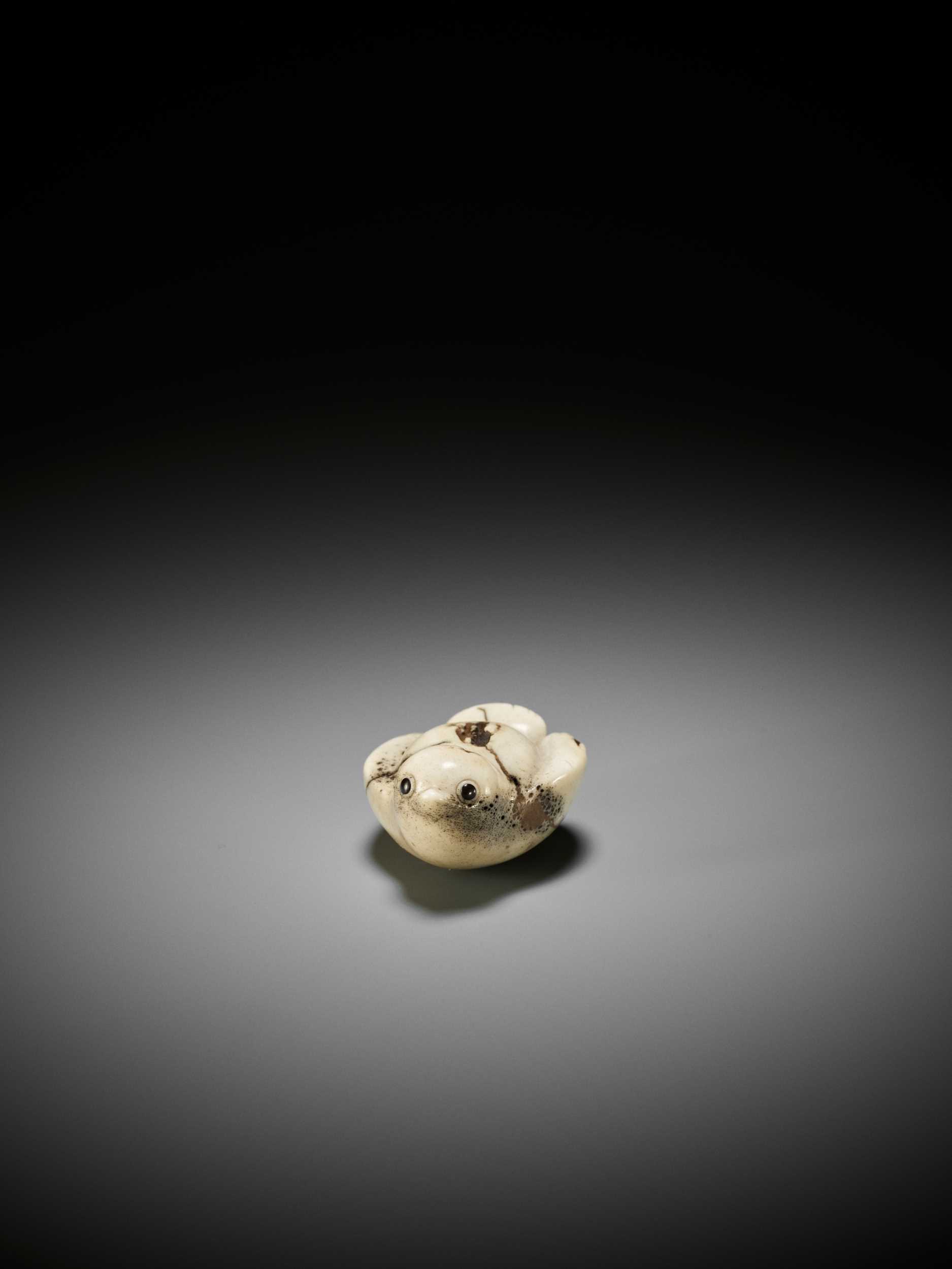 Lot 212 - MASATOSHI: A STAG ANTLER NETSUKE OF A FUKURA