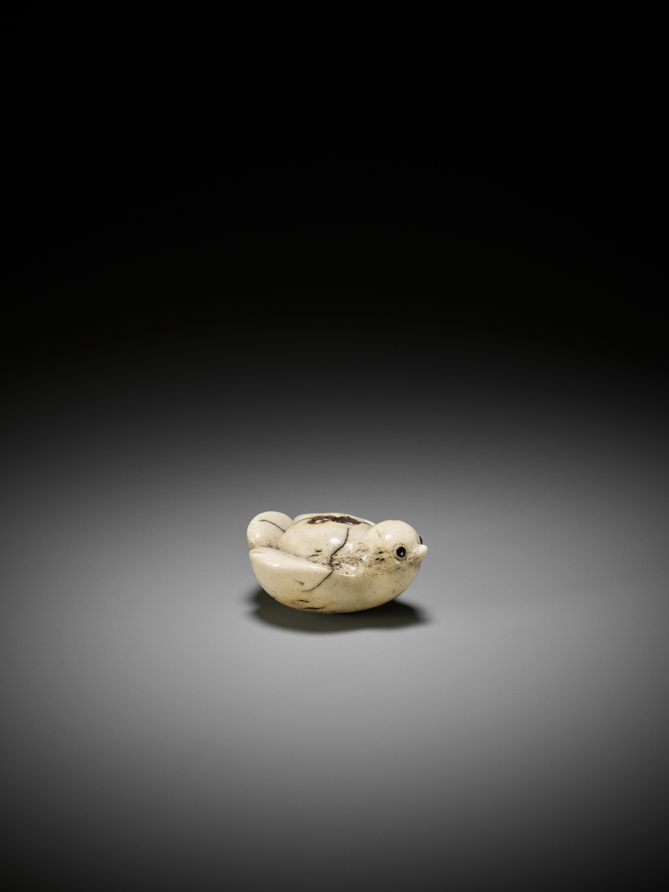 Lot 212 - MASATOSHI: A STAG ANTLER NETSUKE OF A FUKURA