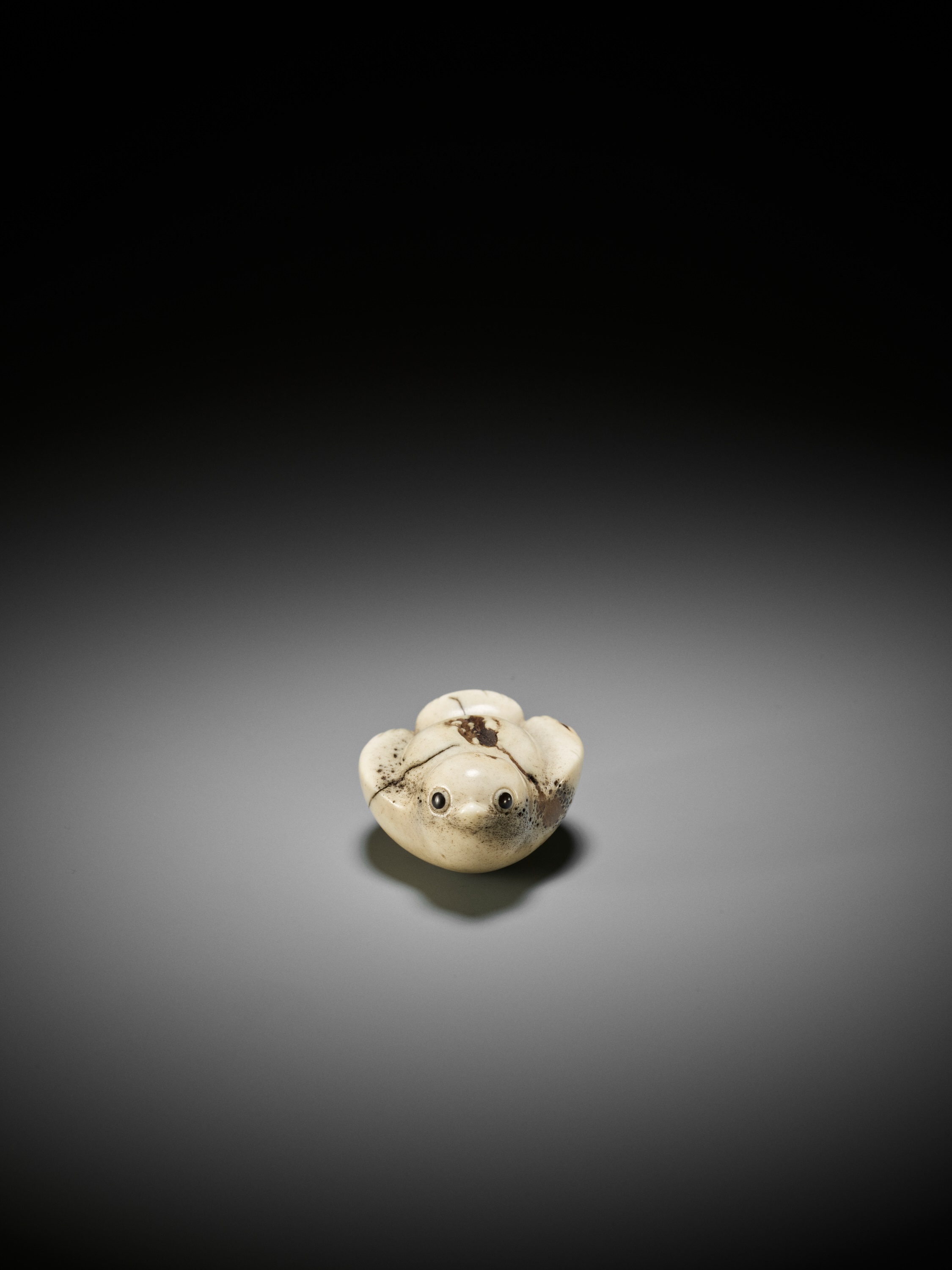Lot 212 - MASATOSHI: A STAG ANTLER NETSUKE OF A FUKURA