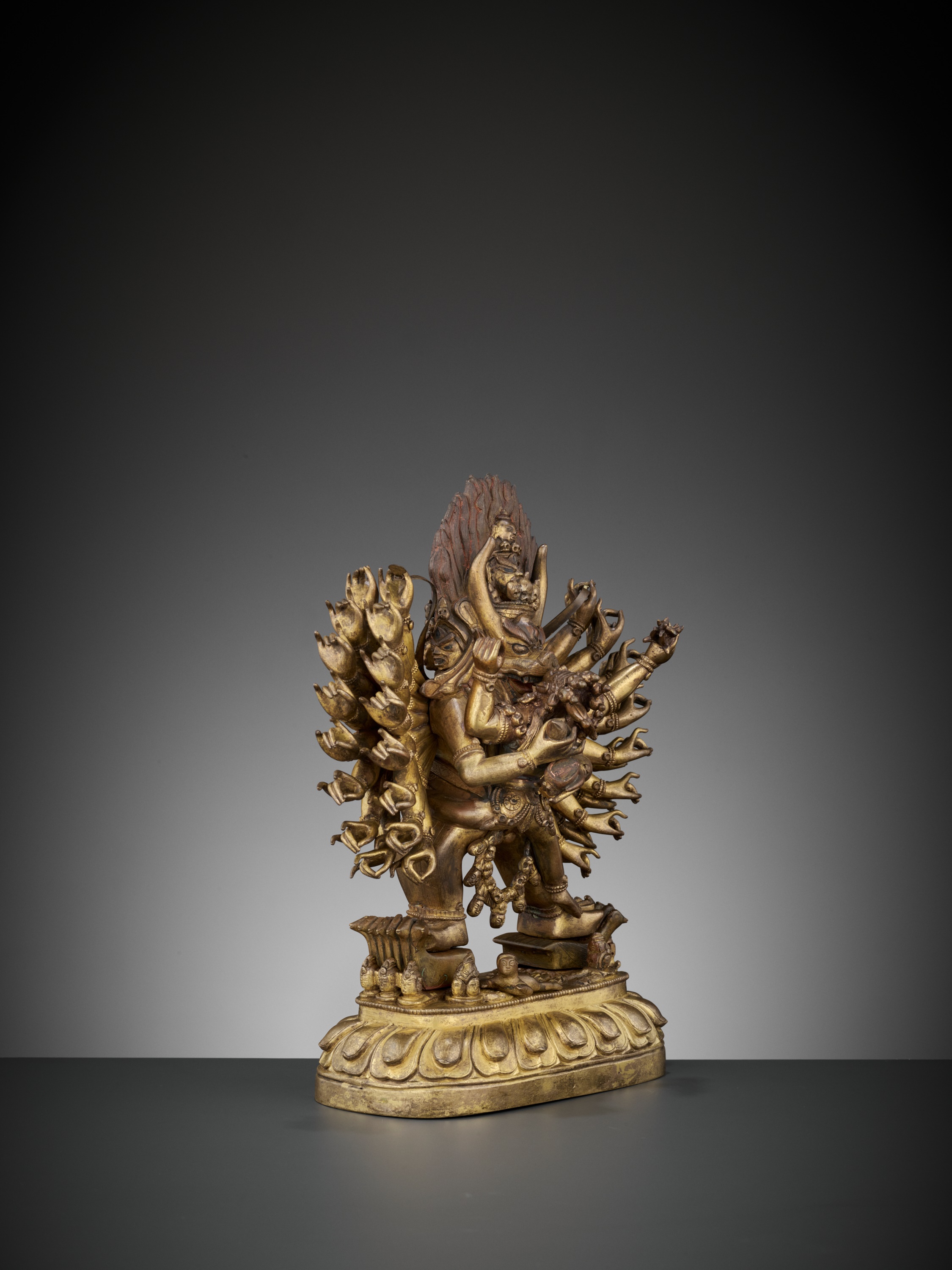Lot 414 - A GILT BRONZE FIGURE OF VAJRABHAIRAVA AND