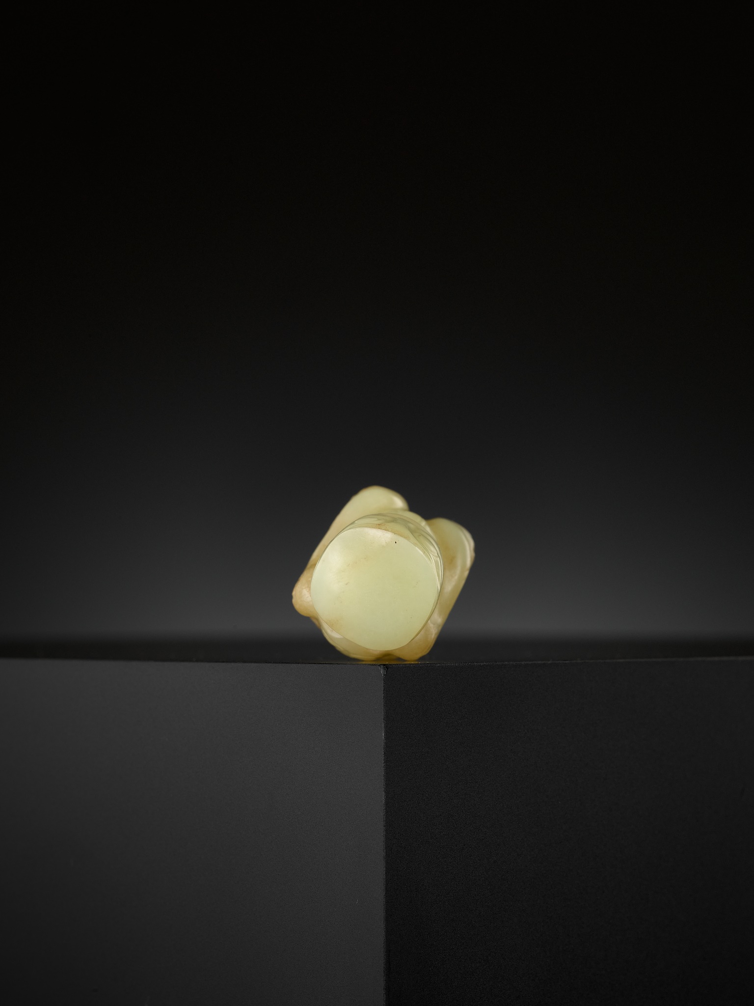 Lot 48 - AN EXTREMELY RARE YELLOW JADE ‘KNEELING