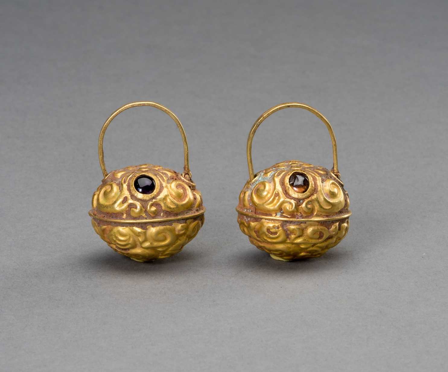 Lot 1193 - A PAIR OF CHAM GOLD REPOUSSÉ ‘KIRTHIMUKHA