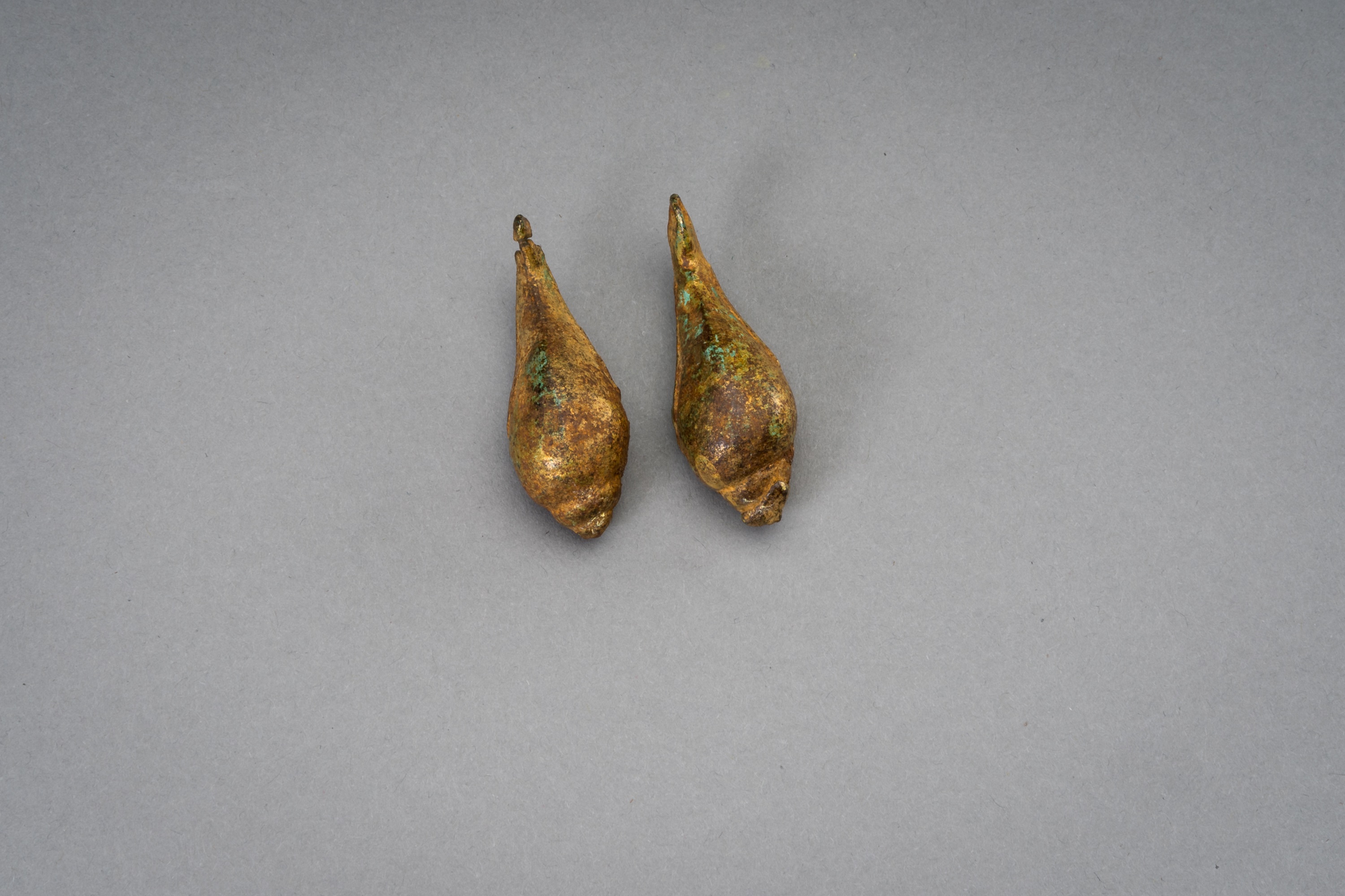 Lot 1169 - A PAIR OF KHMER GOLD CONCH SHELL EARRINGS
