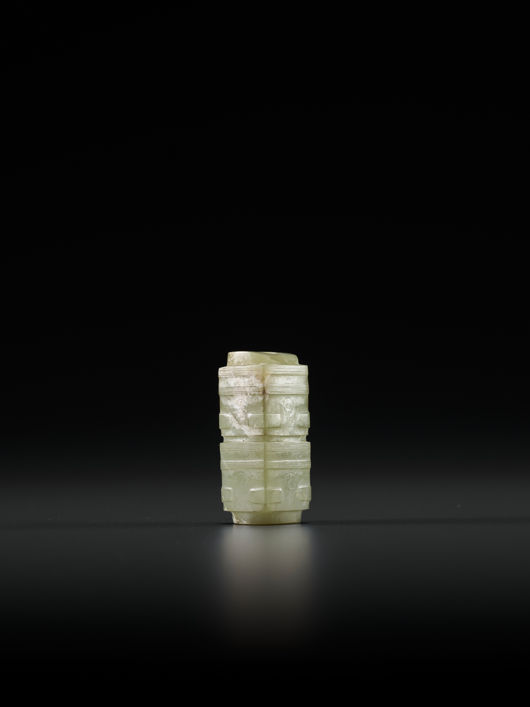 Lot 81 - A MINIATURE JADE CONG-FORM BEAD, LIANGZHU