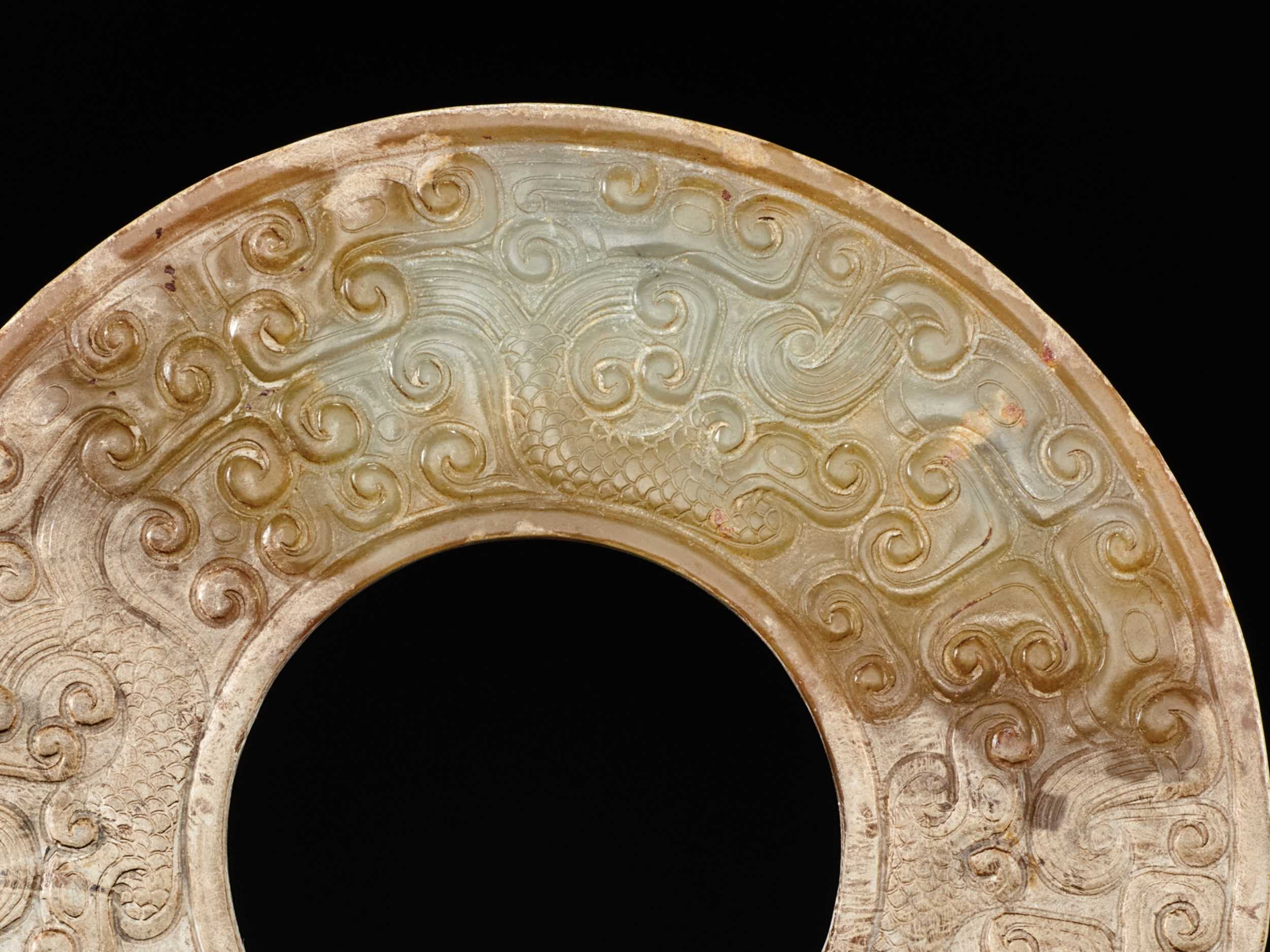 Lot 146 - A JADE DISC, HUAN, EASTERN ZHOU DYNASTY